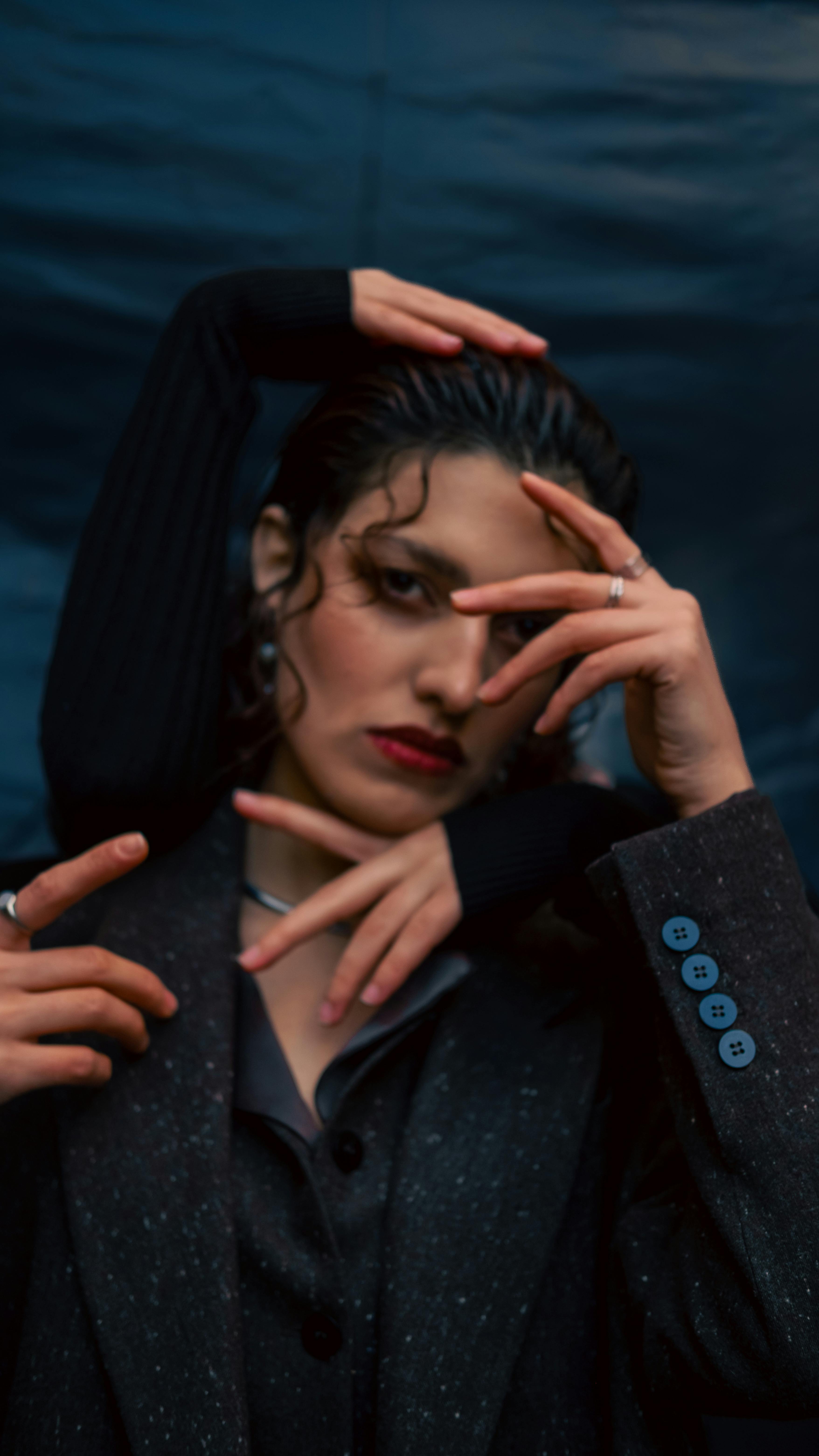 Artistic Portrait with Intriguing Hand Poses · Free Stock Photo