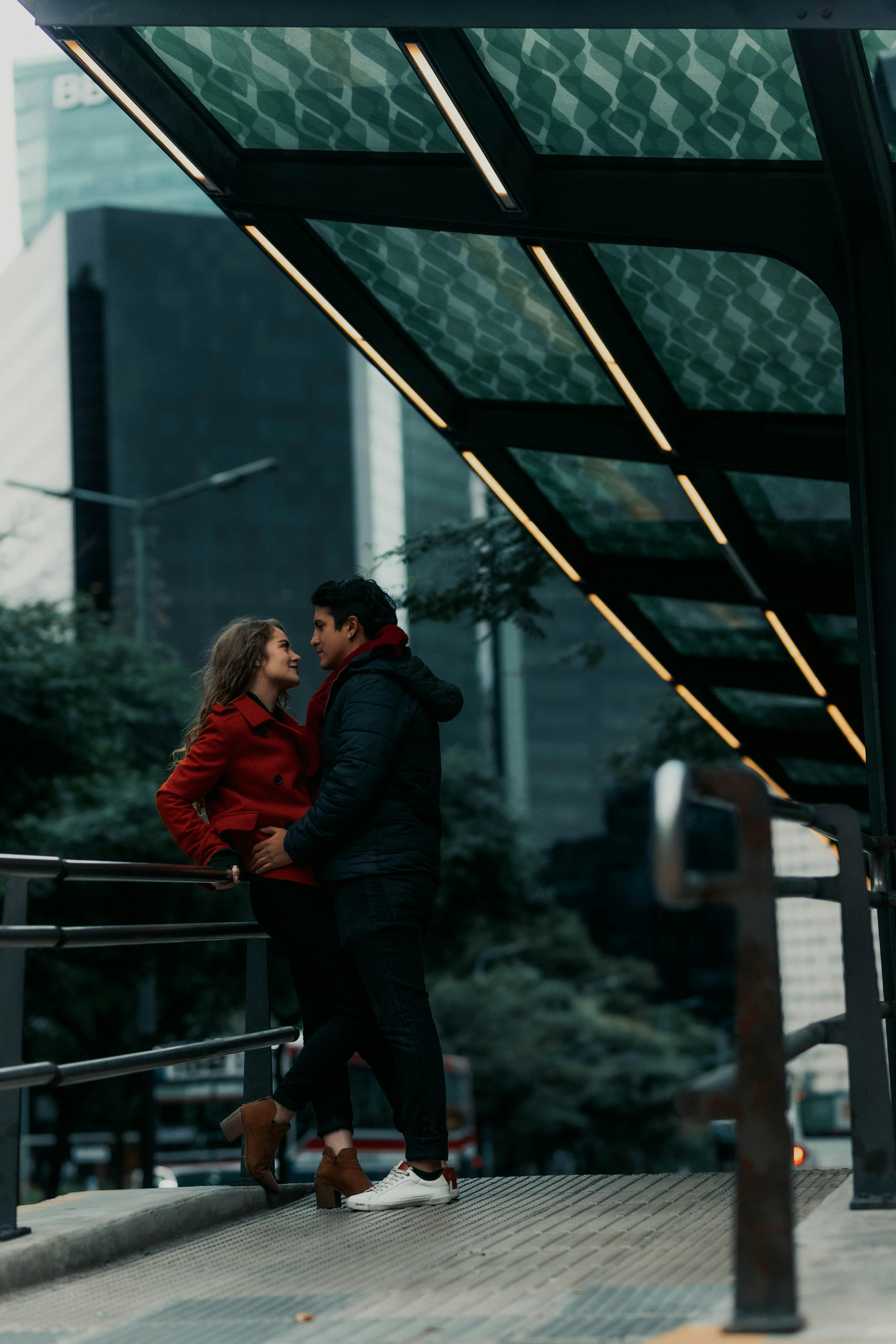 Romantic Couple at Buenos Aires Bus Stop · Free Stock Photo