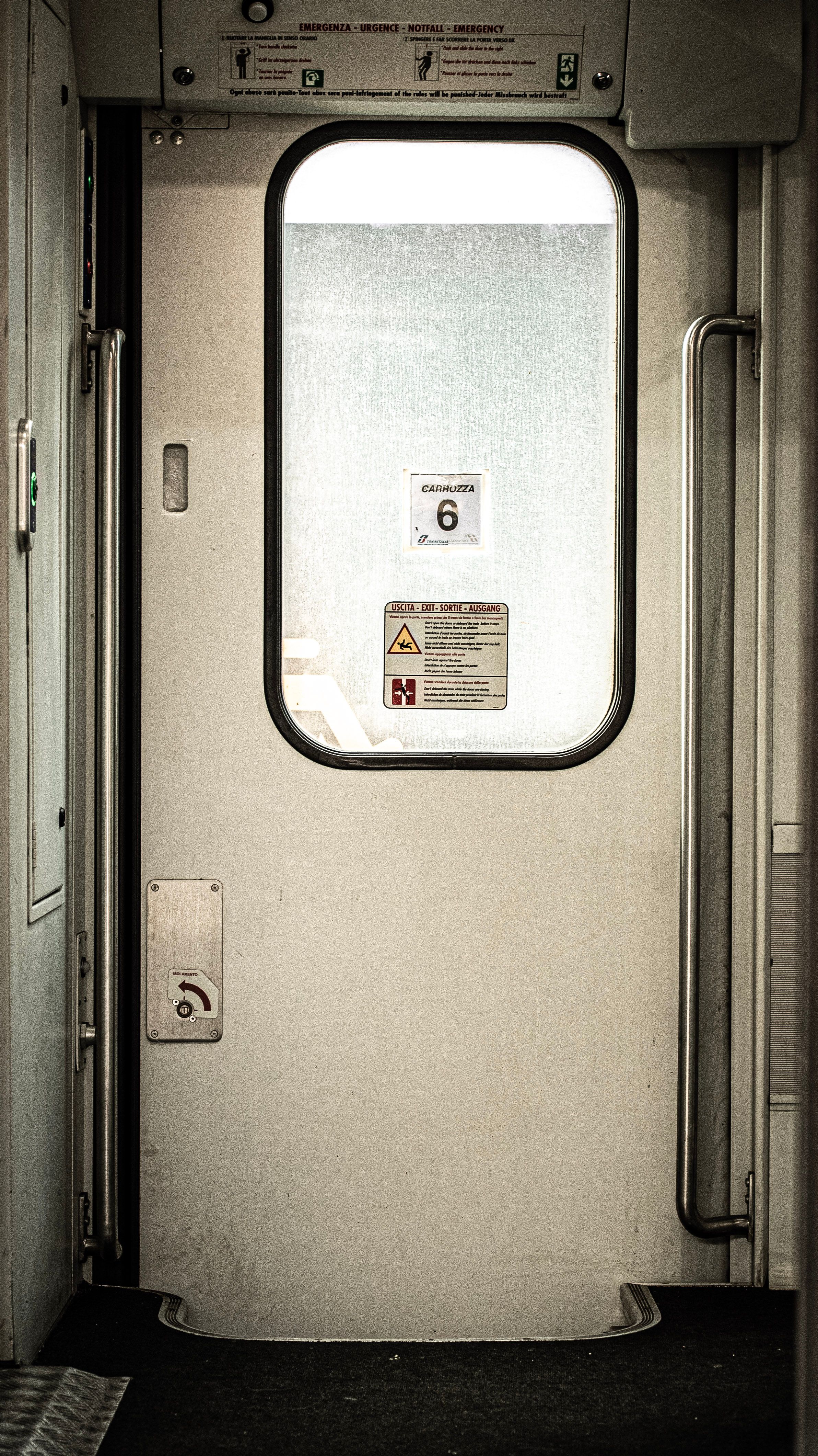 Interior of Train Door in Florence, Italy · Free Stock Photo