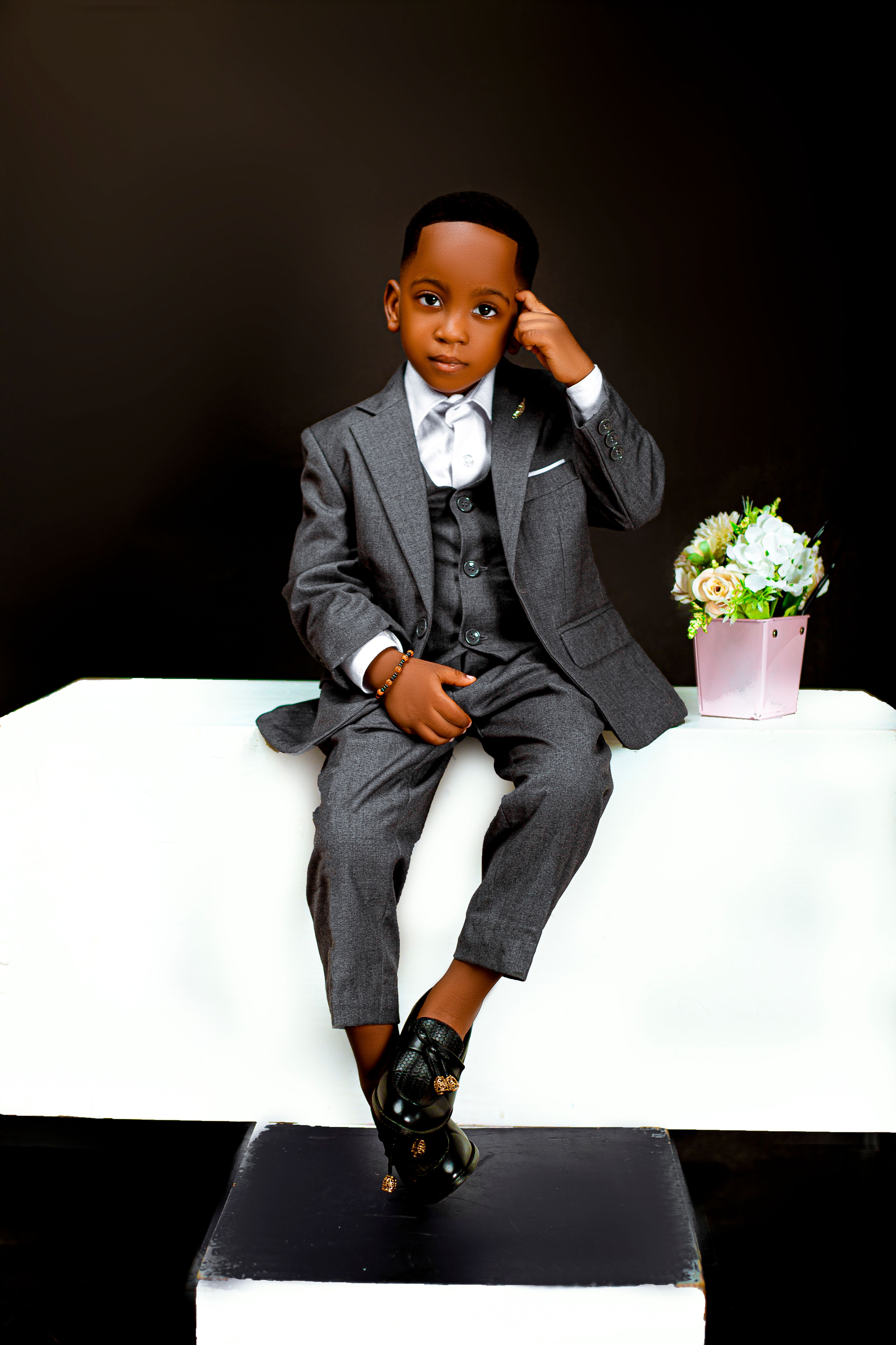 Stylish Young Boy in Formal Attire · Free Stock Photo