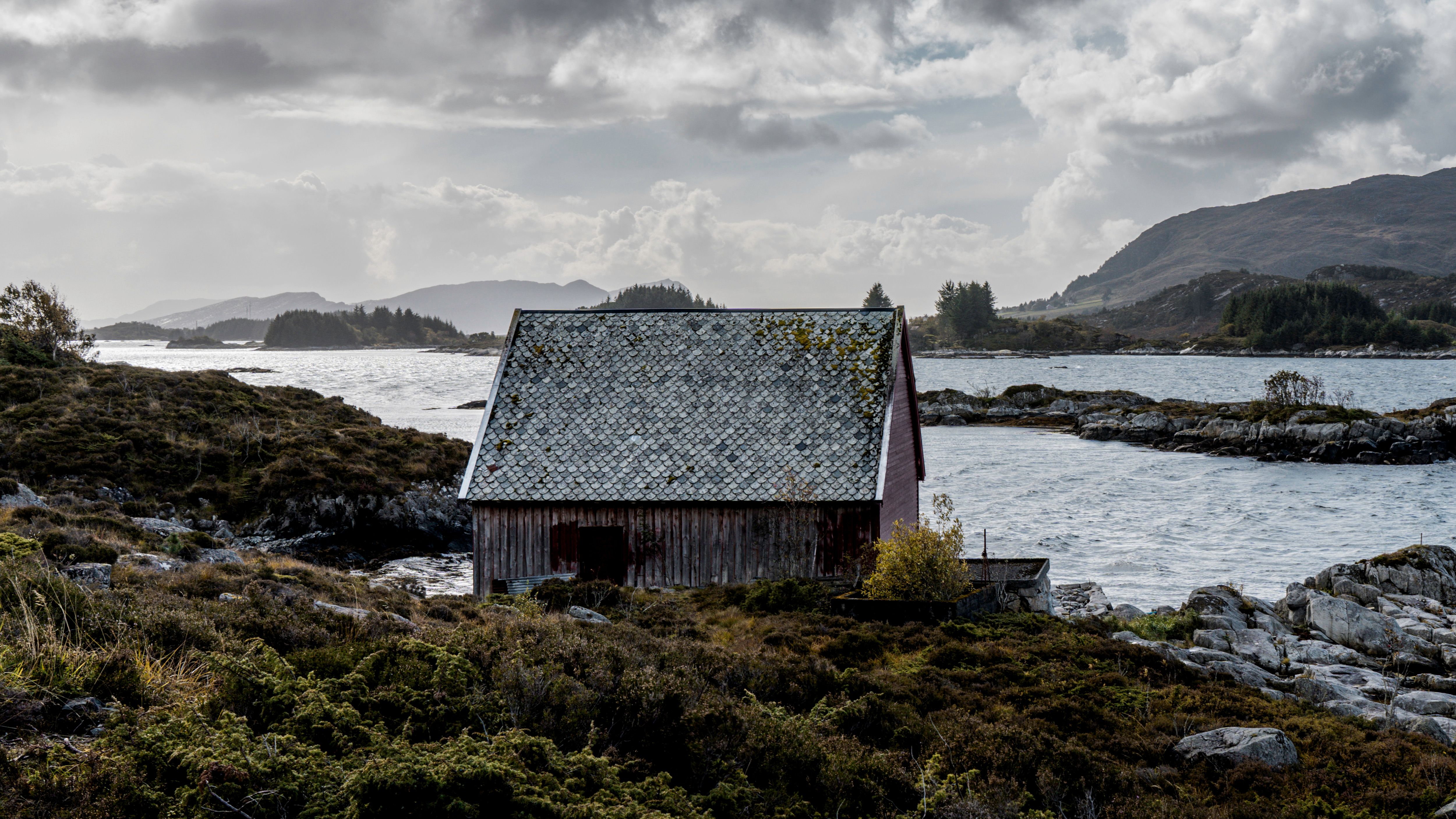 Scenic Norwegian Cottage by a Fjord · Free Stock Photo