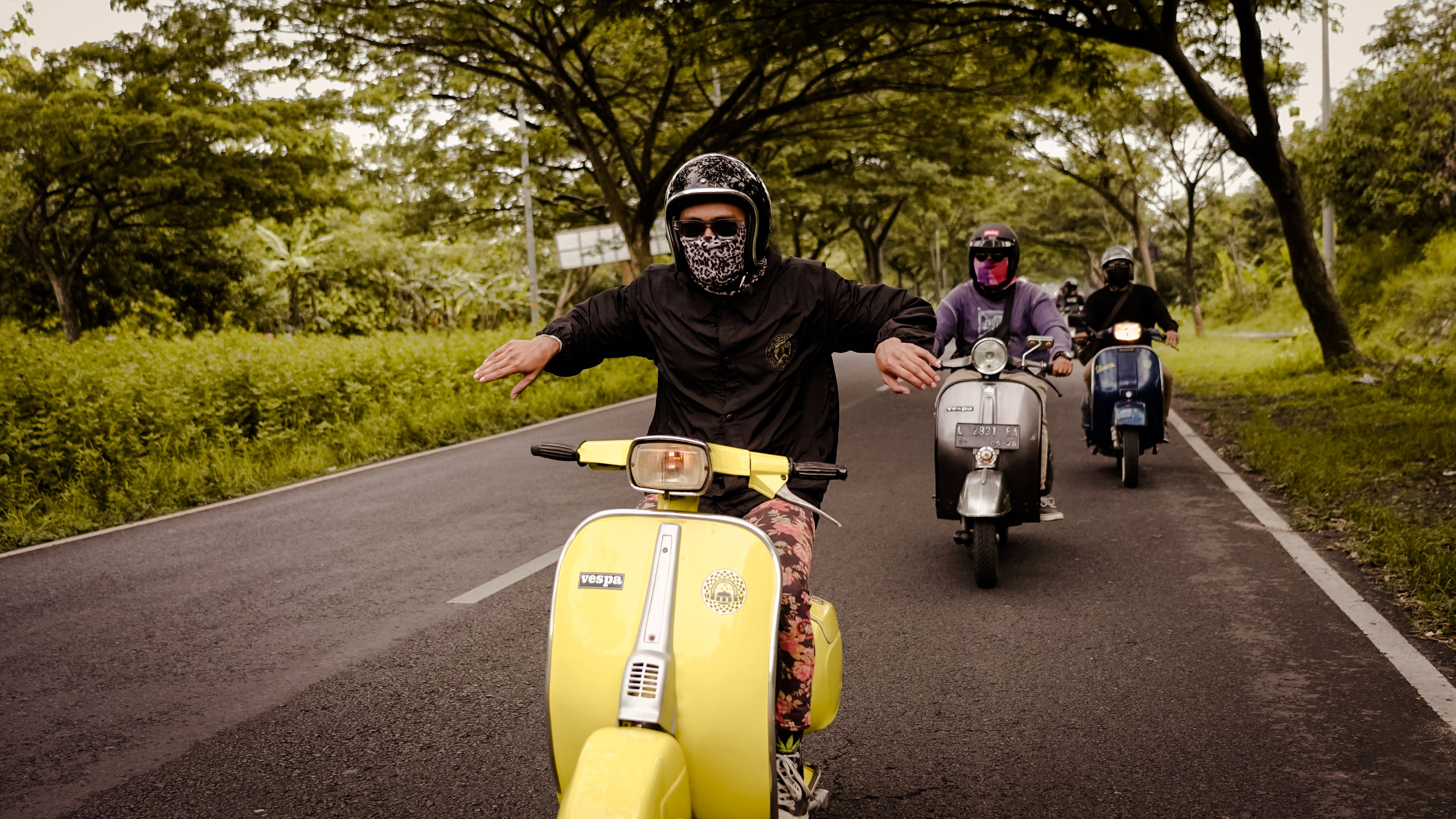 Vespa Scooter Enthusiasts Riding in East Java · Free Stock Photo