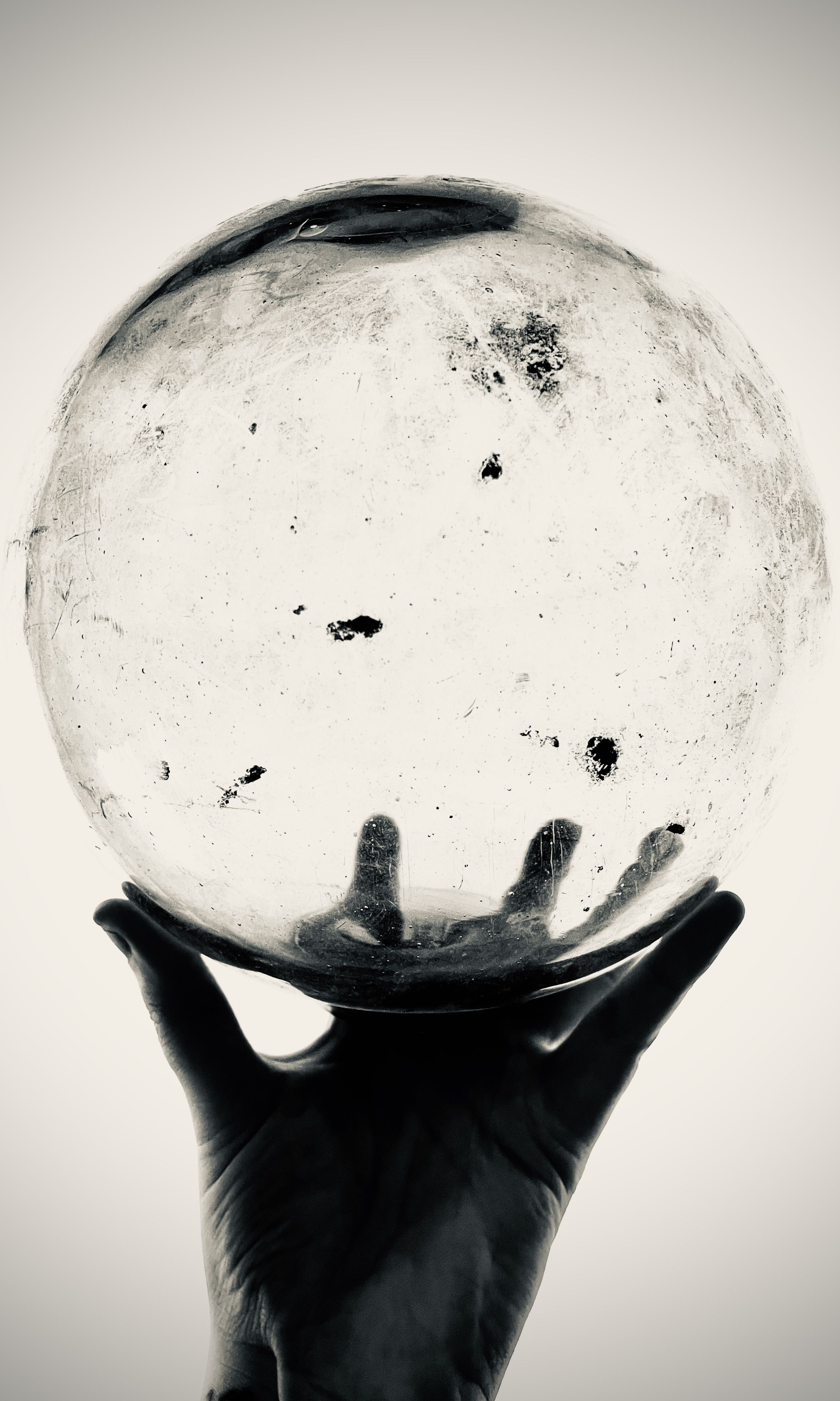 Abstract Hand Holding Glass Globe Art · Free Stock Photo