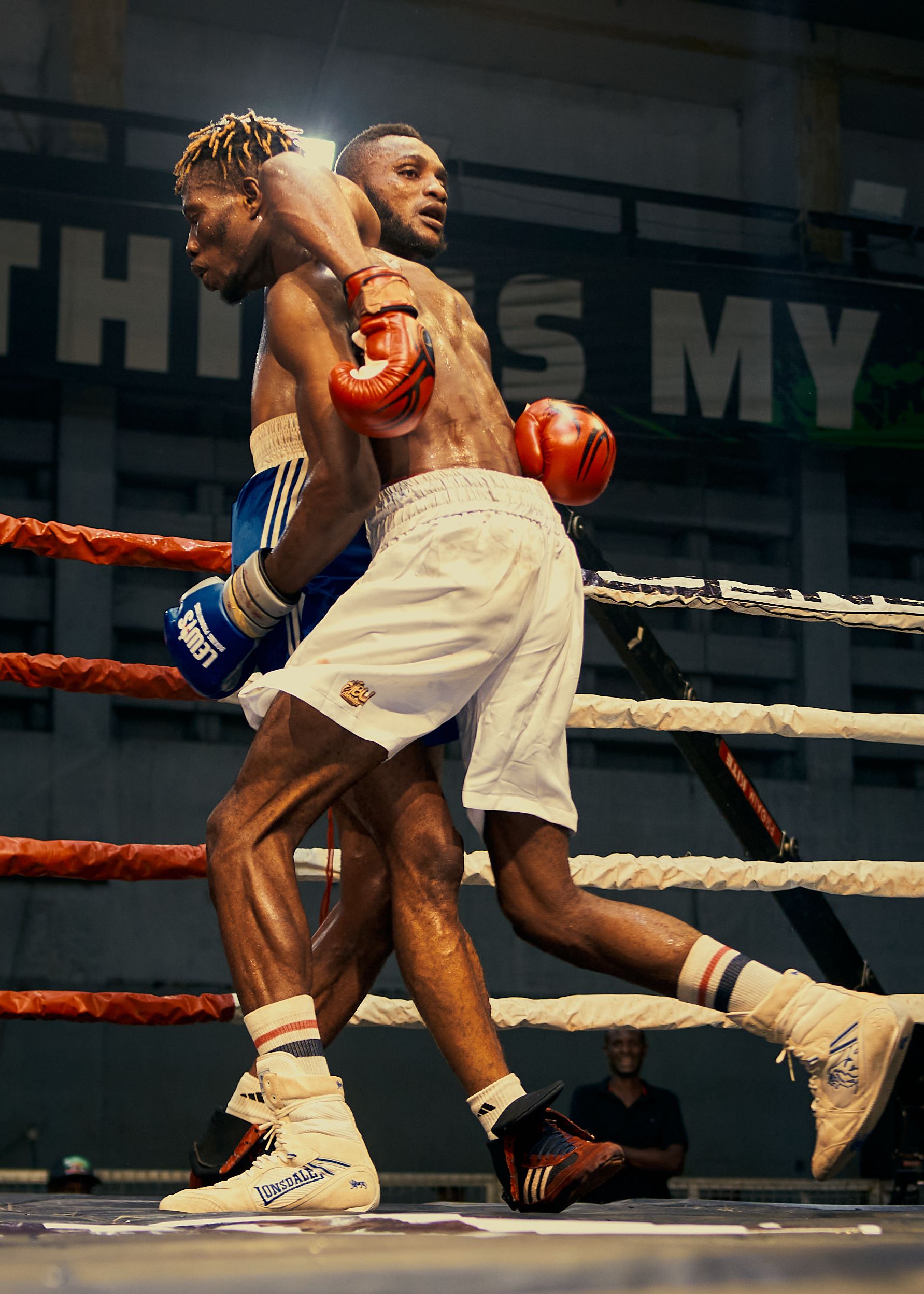 Intense Boxing Match in Lagos Ring · Free Stock Photo