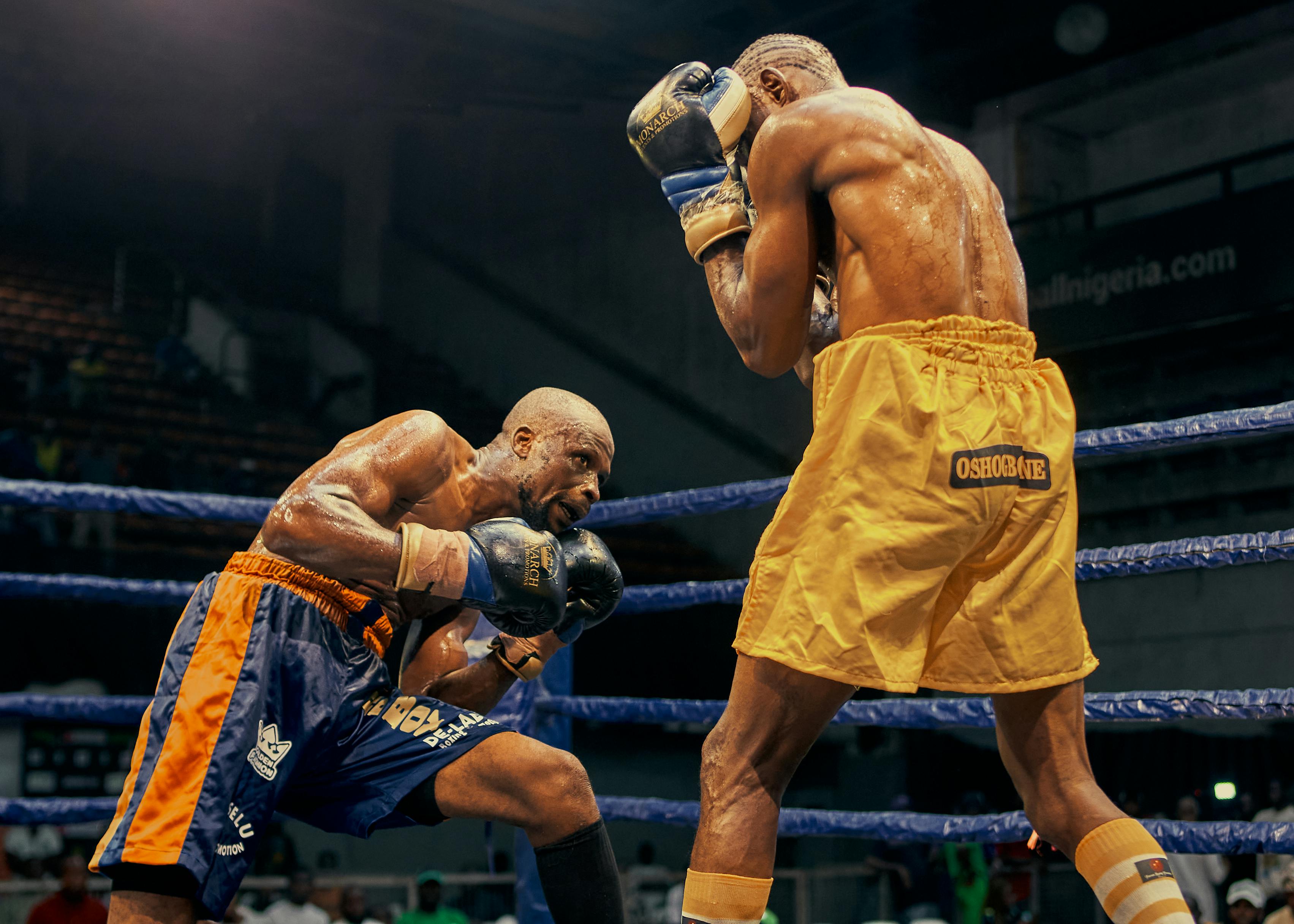 Intense Boxing Match in Lagos Arena · Free Stock Photo