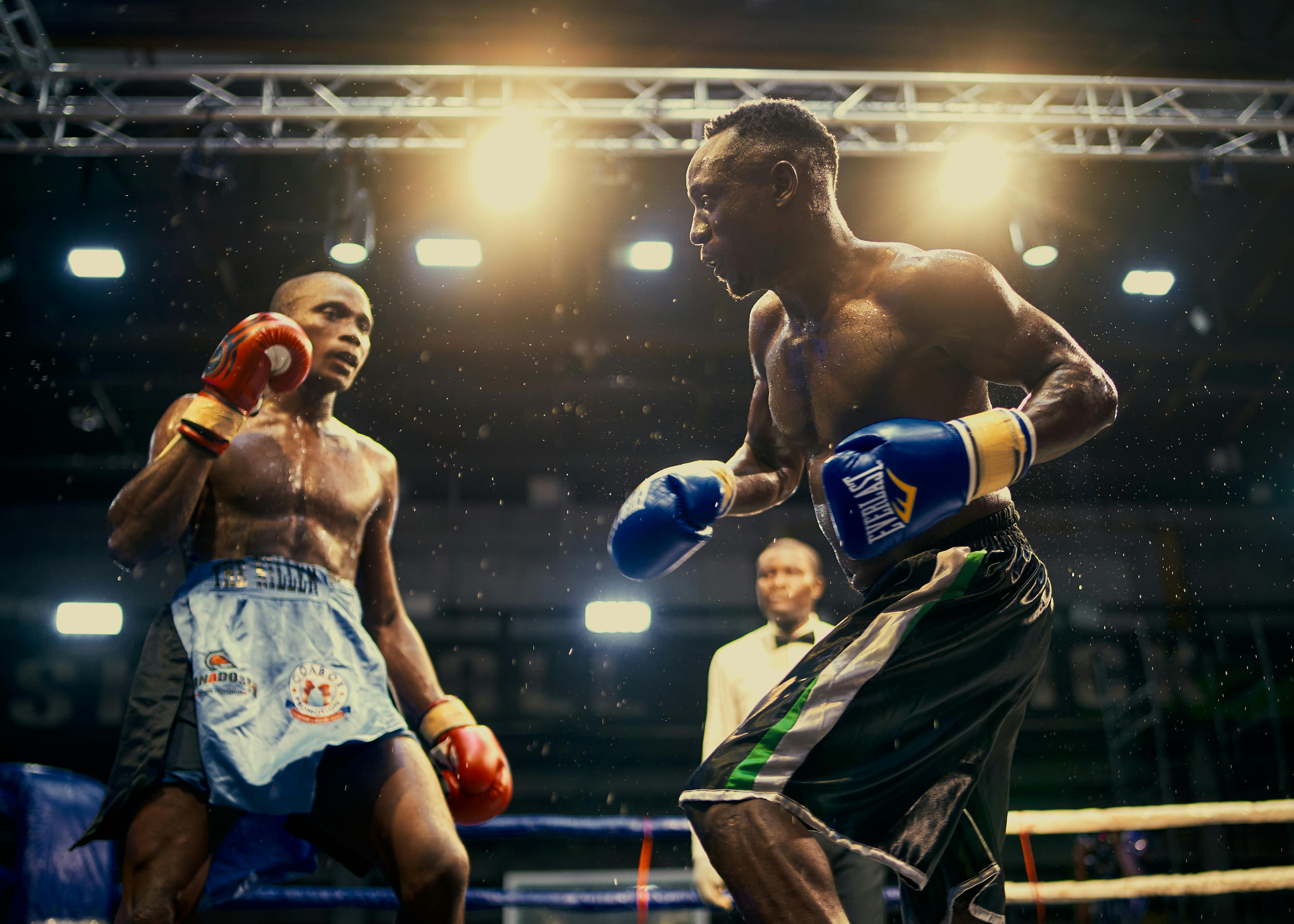 Intense Boxing Match in Lagos Arena · Free Stock Photo