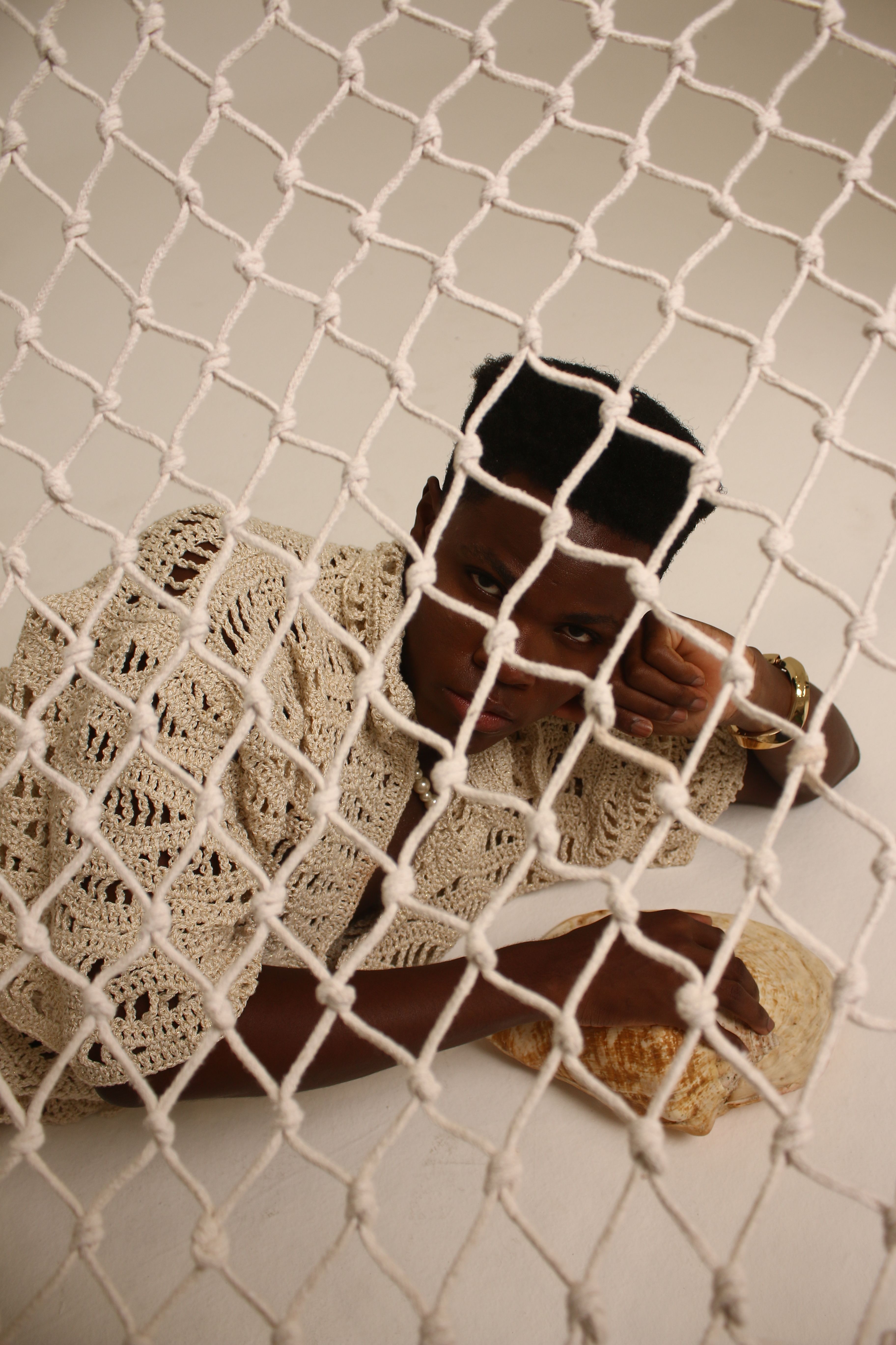 Portrait of Woman Through Crochet Netting · Free Stock Photo