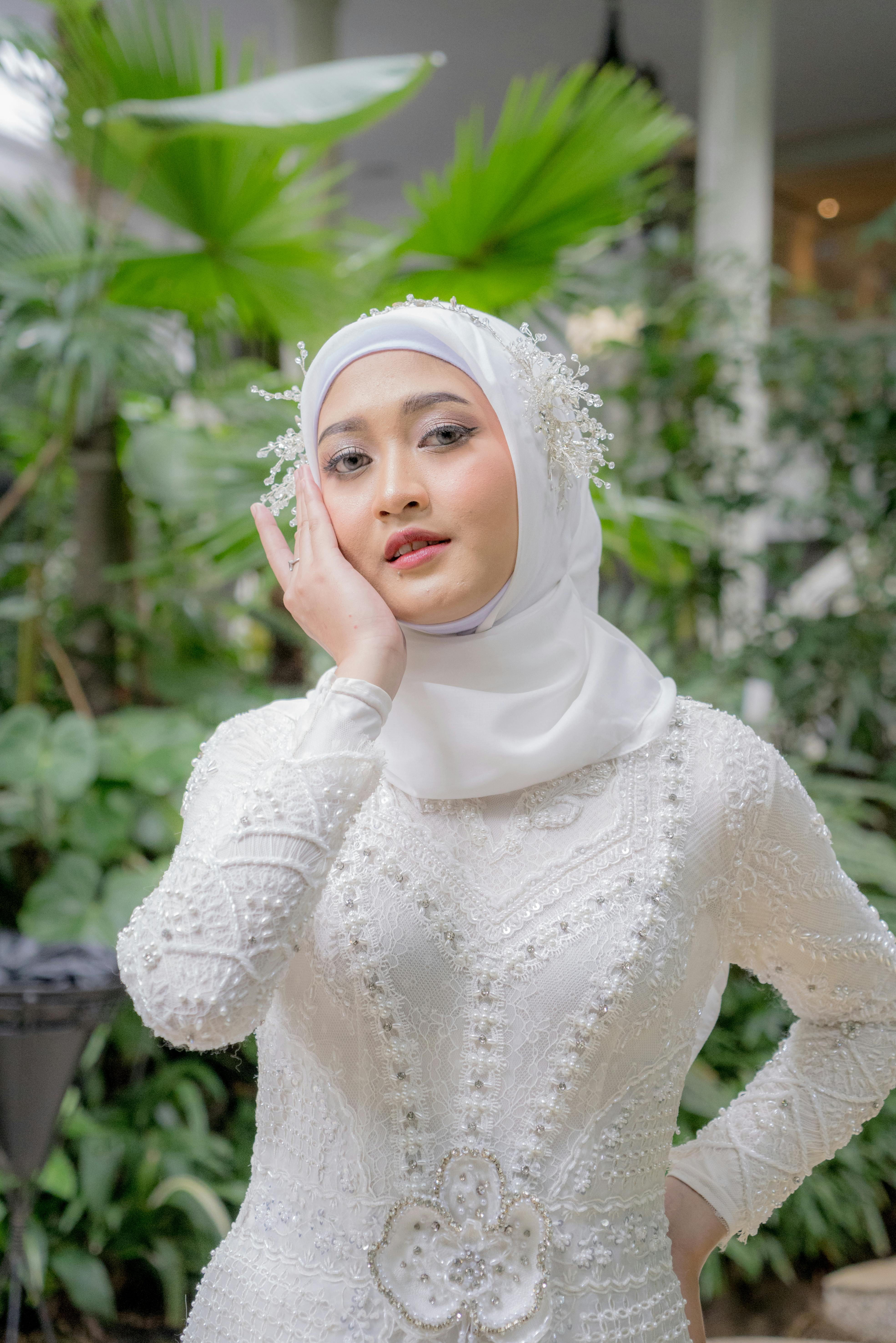 Elegant Indonesian Bride in White Hijab Outdoors · Free Stock Photo