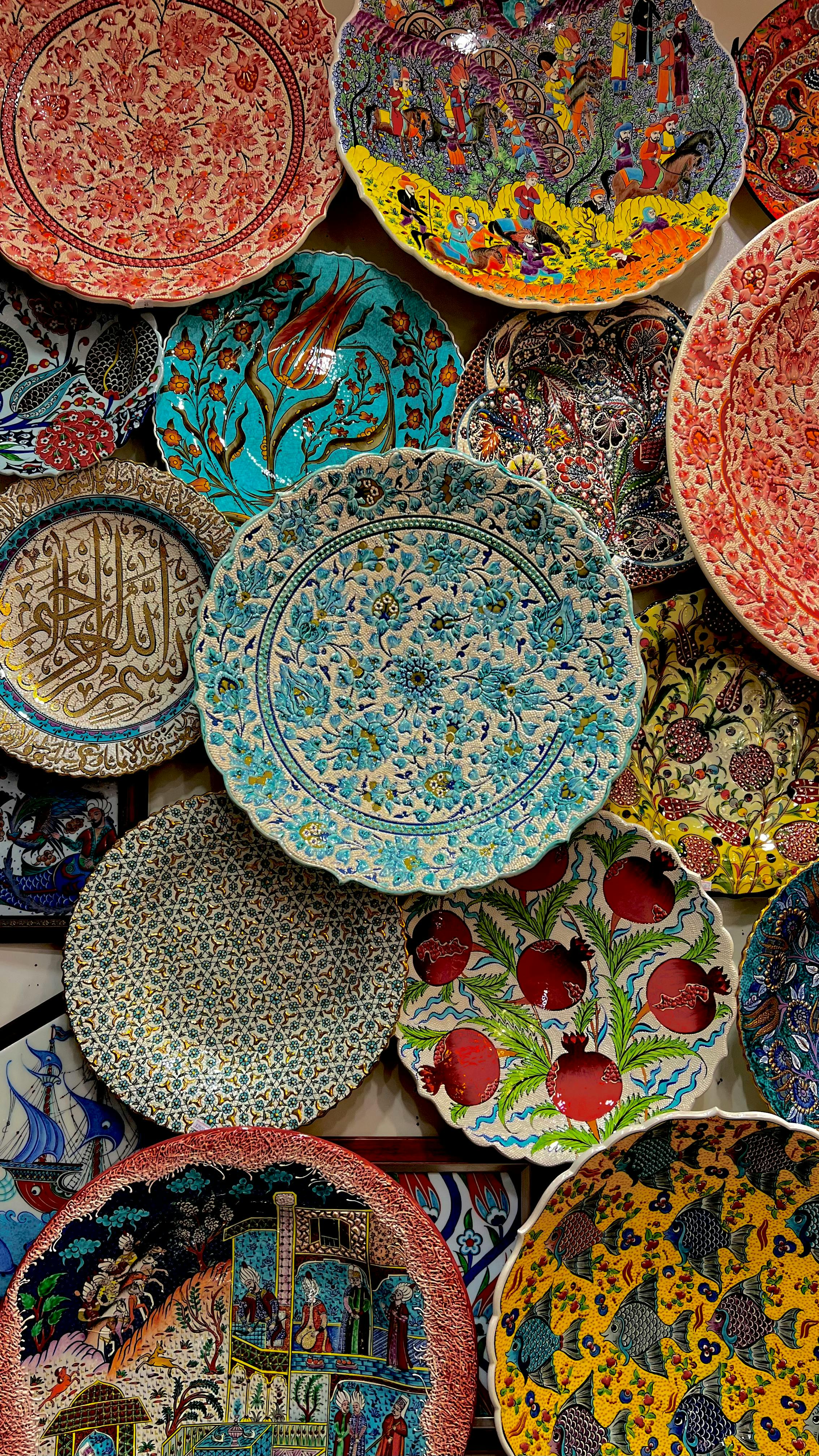 Colorful Traditional Ceramic Plates Display · Free Stock Photo