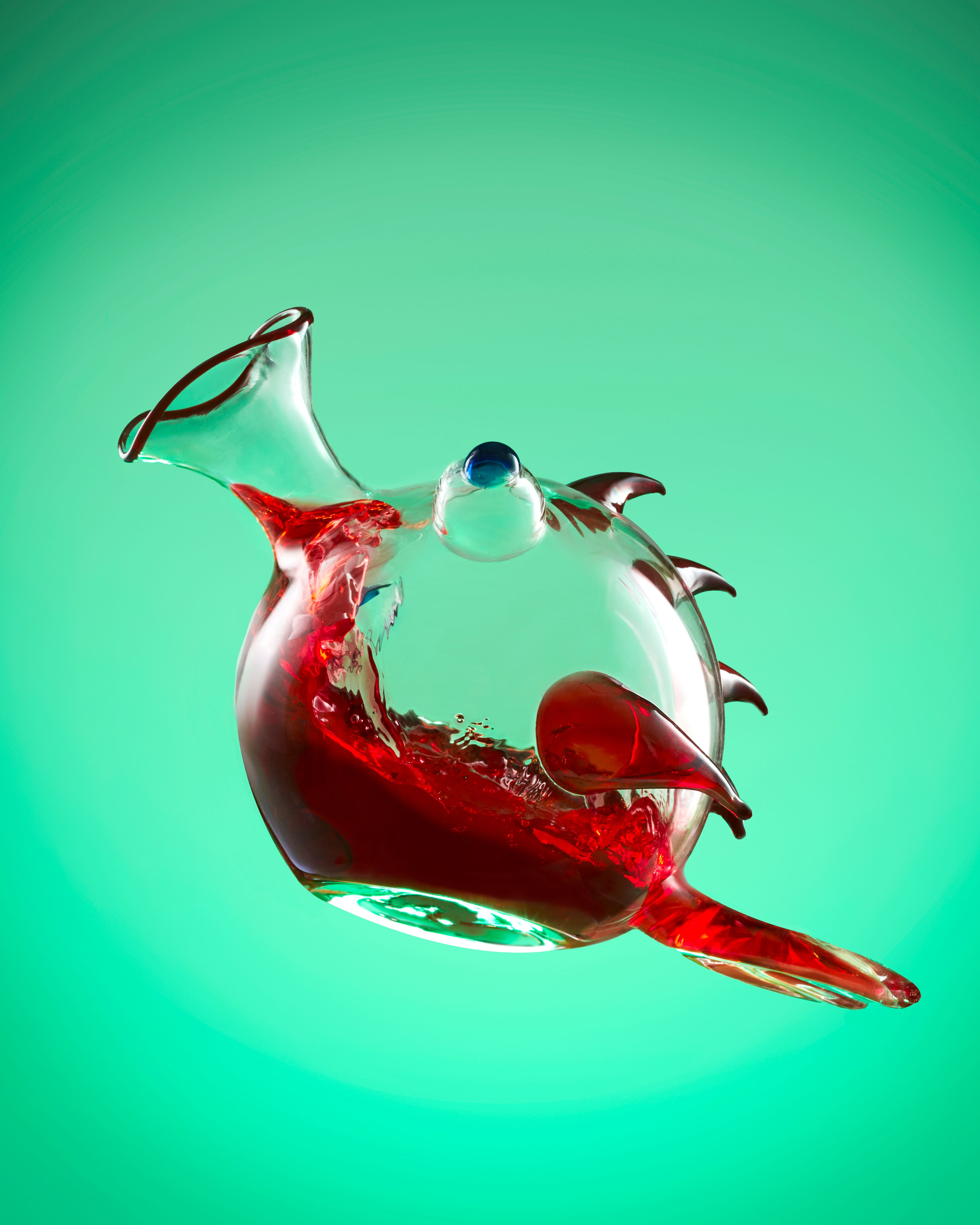 Creative Glass Pitcher with Red Liquid Art · Free Stock Photo