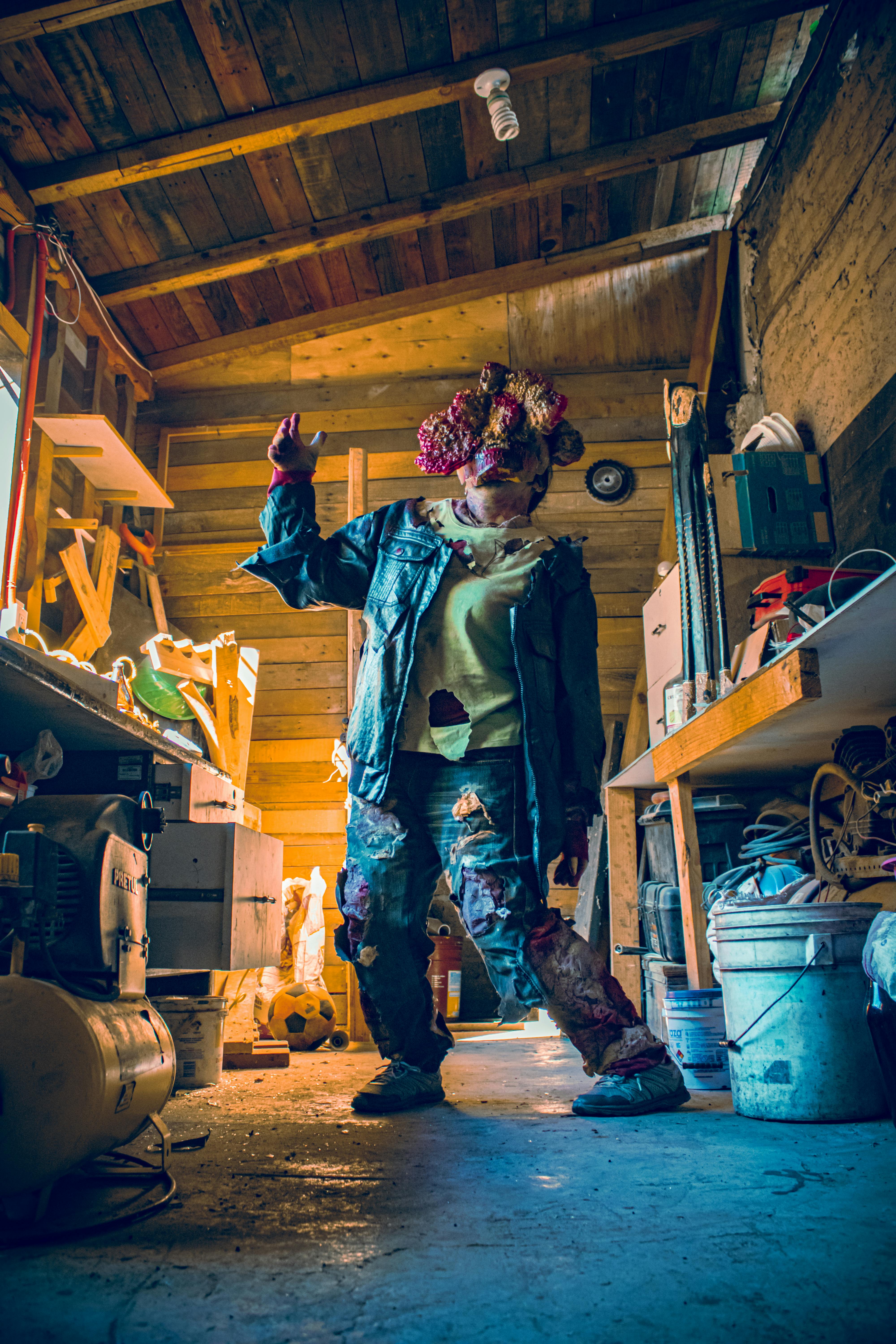 Zombie Cosplay in Urban Workshop Setting · Free Stock Photo