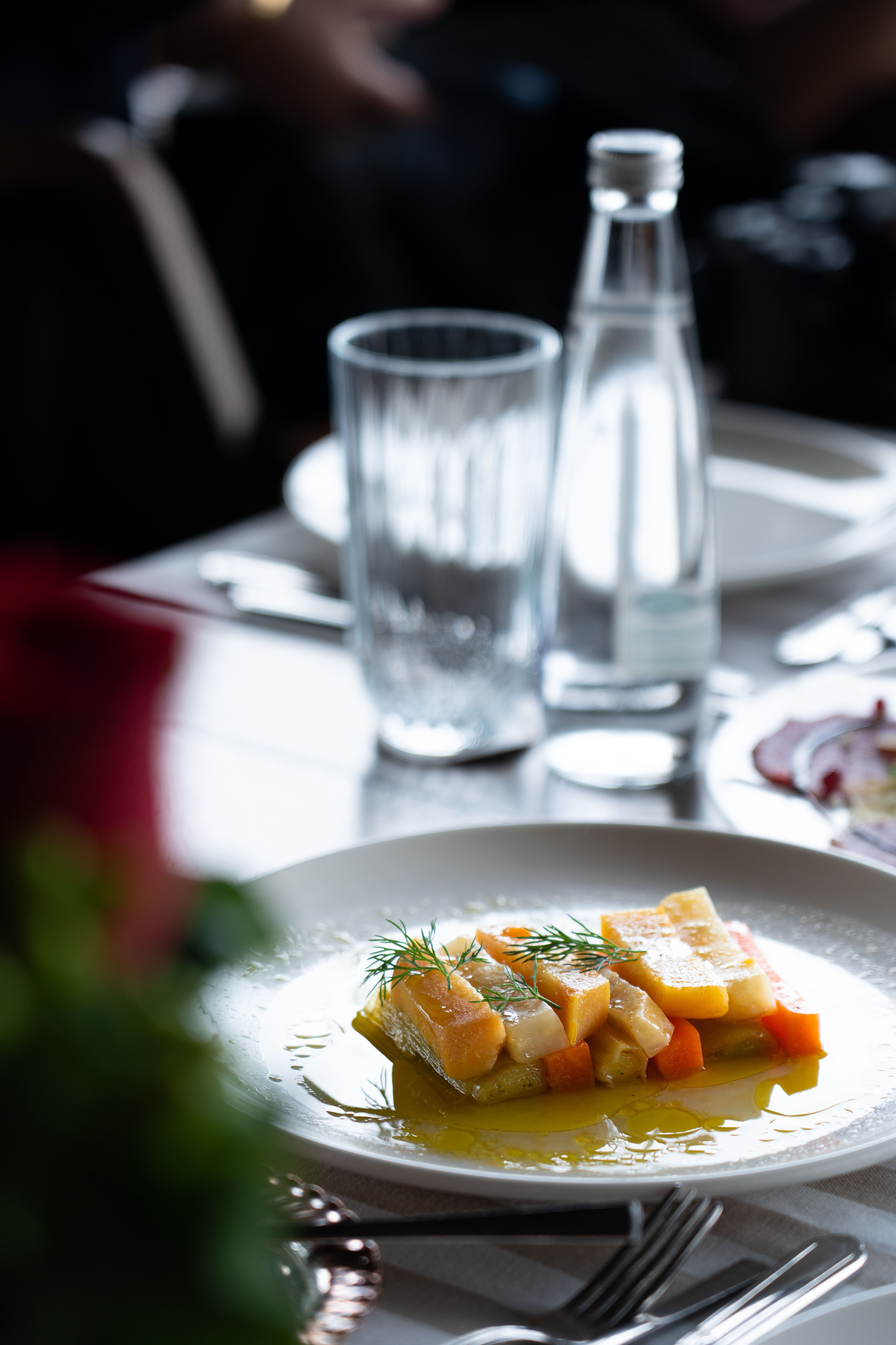 Elegant Plated Dish on Fine Dining Table · Free Stock Photo