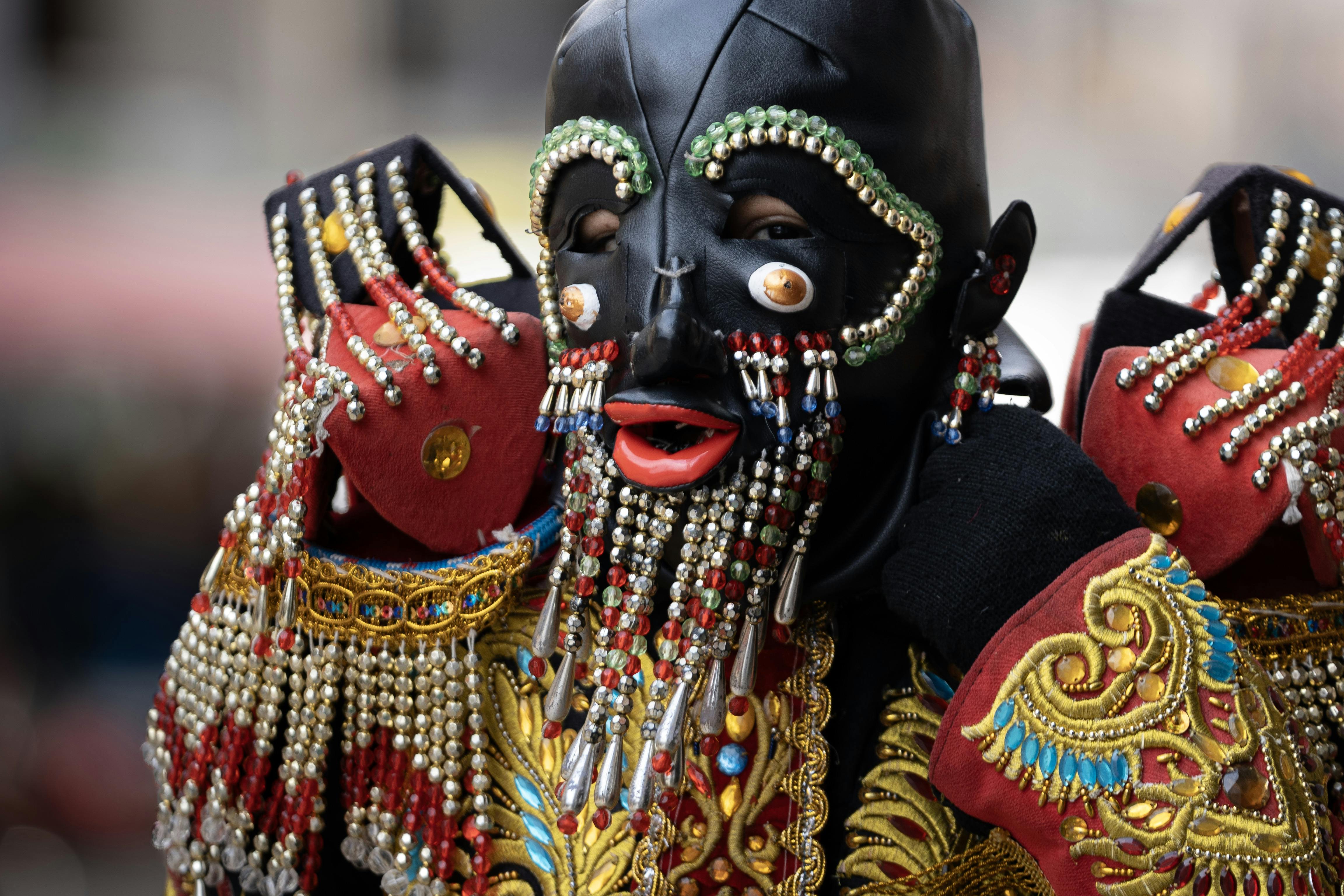 Traditional Andean Costume Mask Close-up with Beads · Free Stock Photo