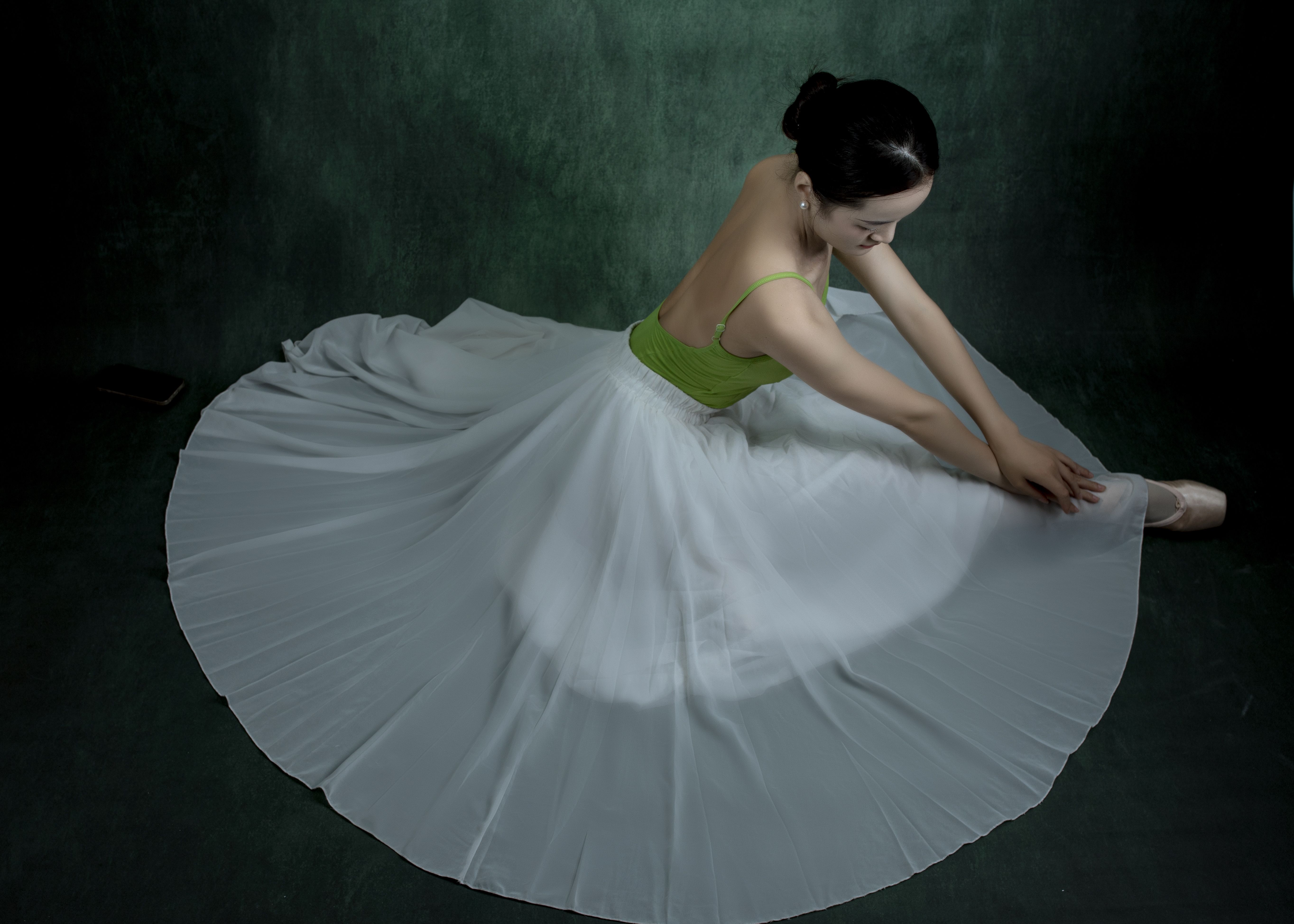Elegant Ballerina Performing Graceful Dance Pose · Free Stock Photo