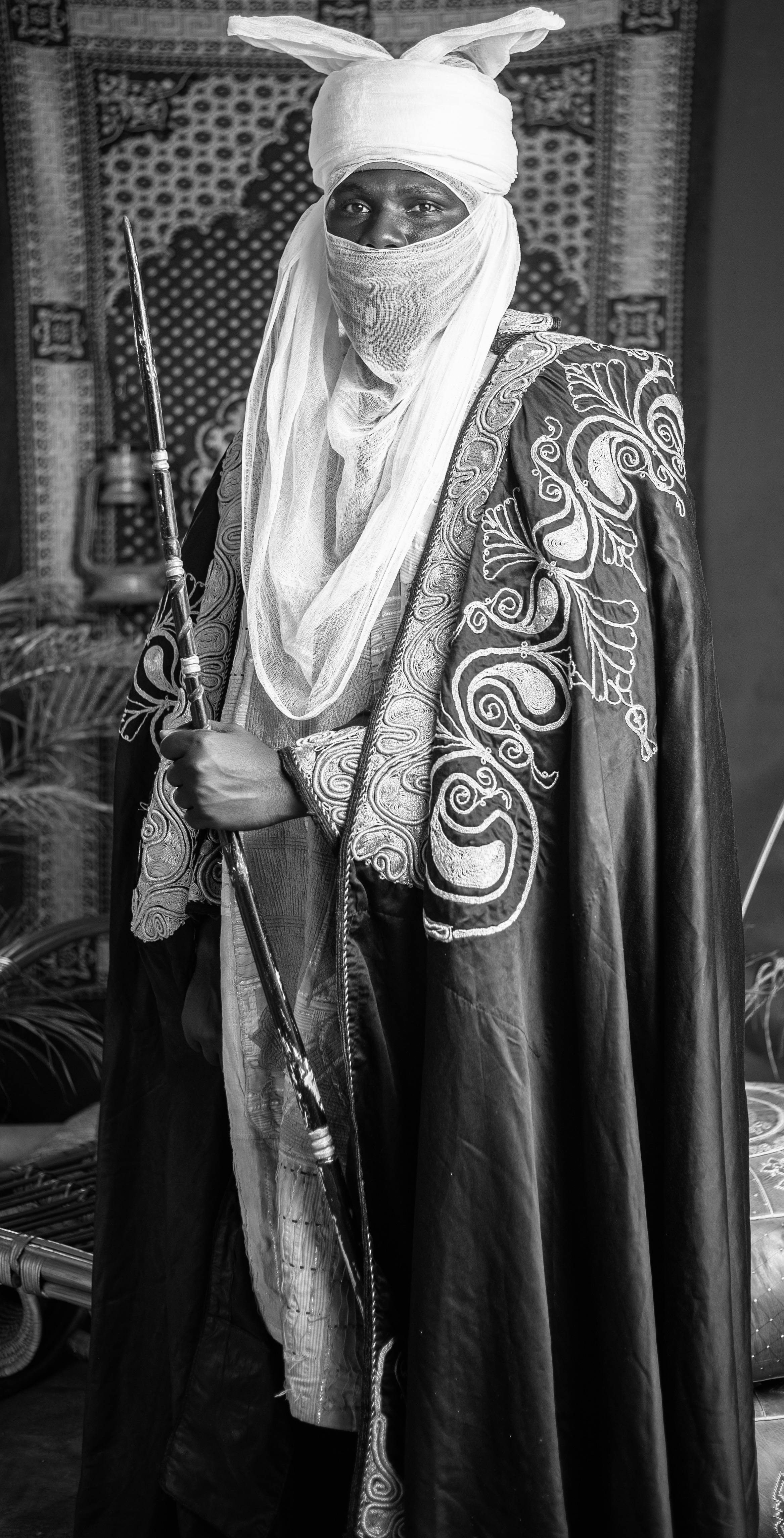 Traditional Regal Attire in Black and White Portrait · Free Stock Photo