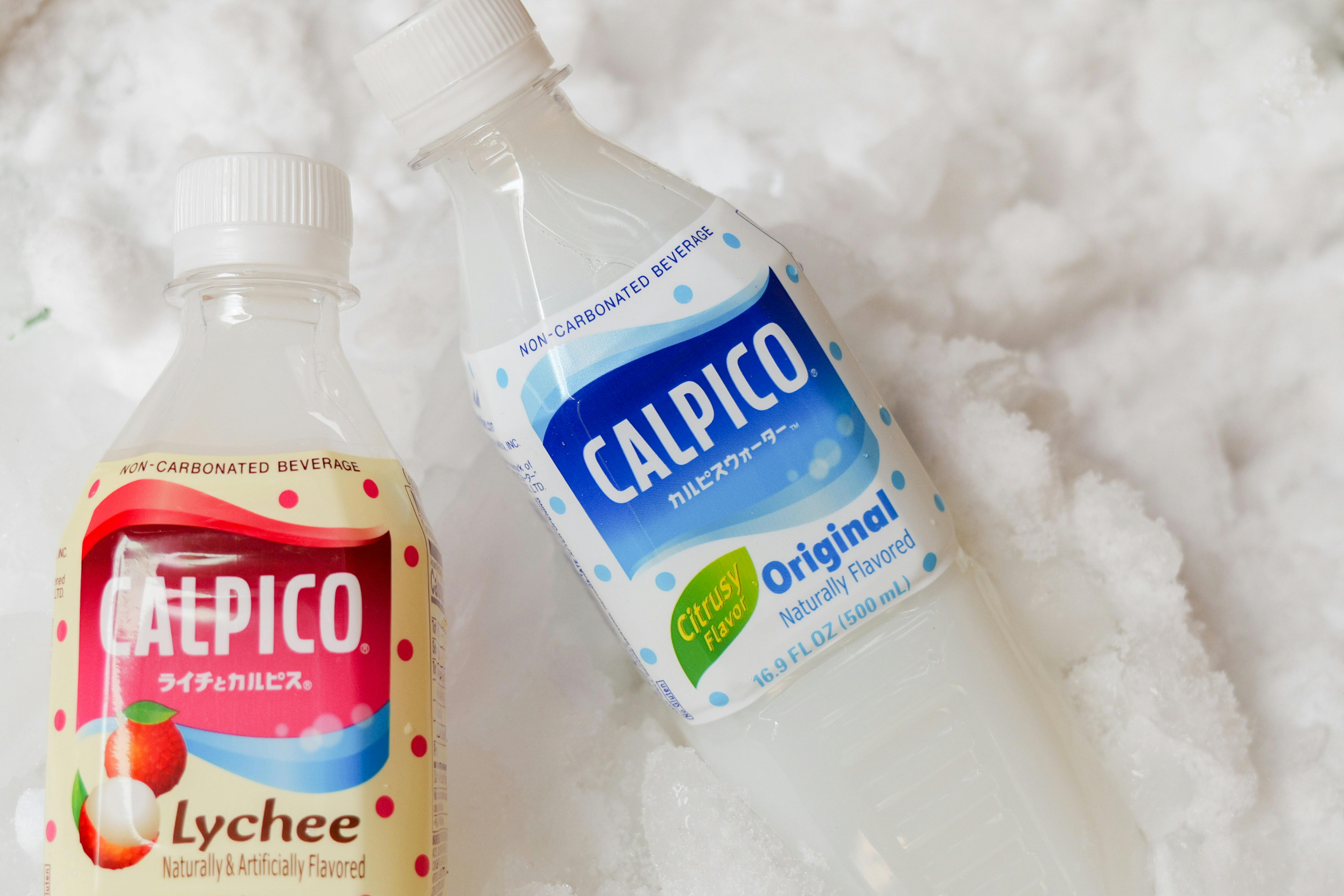 Refreshing Calpico Beverages on Crushed Ice · Free Stock Photo