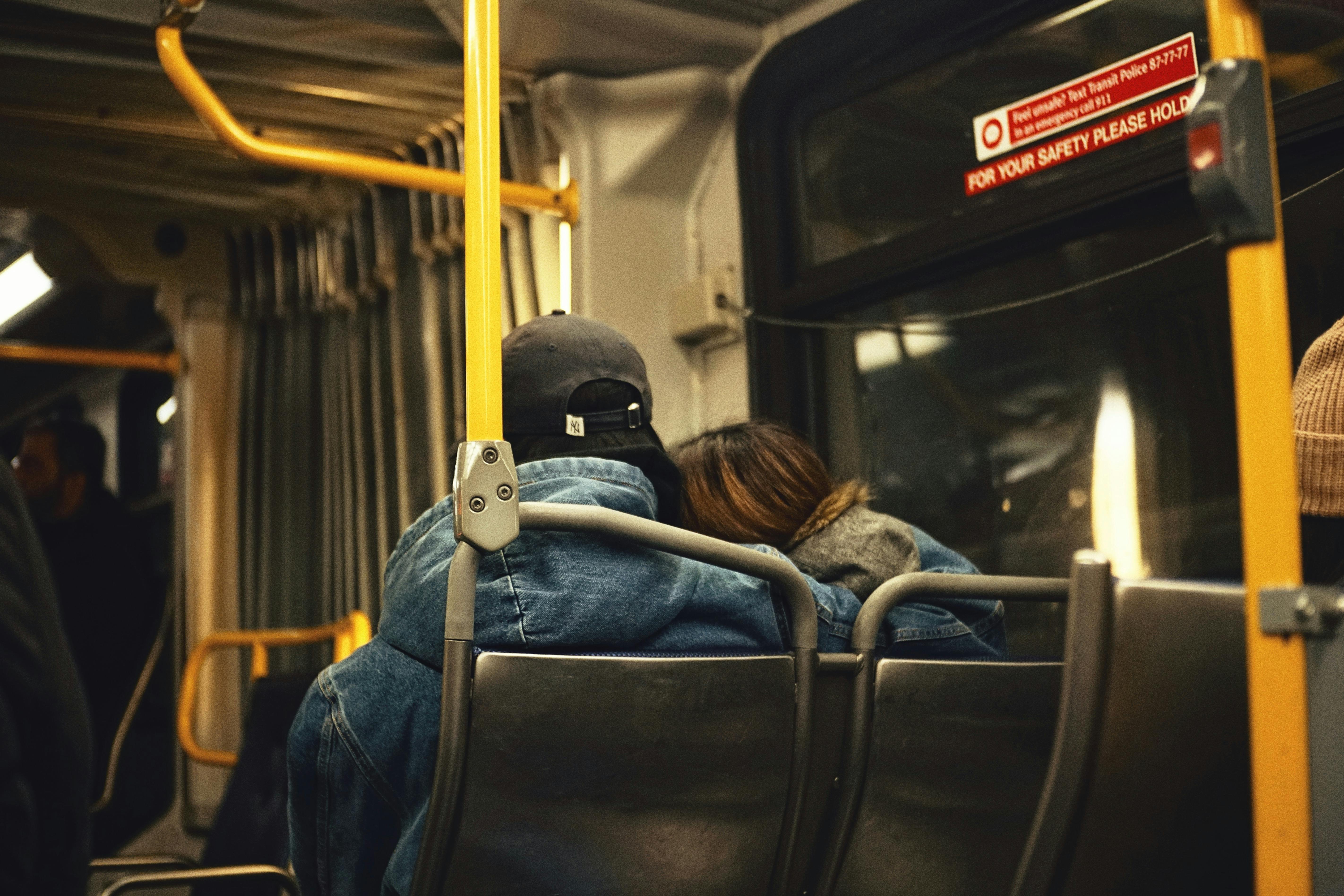 Cozy Couple on Vancouver Transit Bus · Free Stock Photo