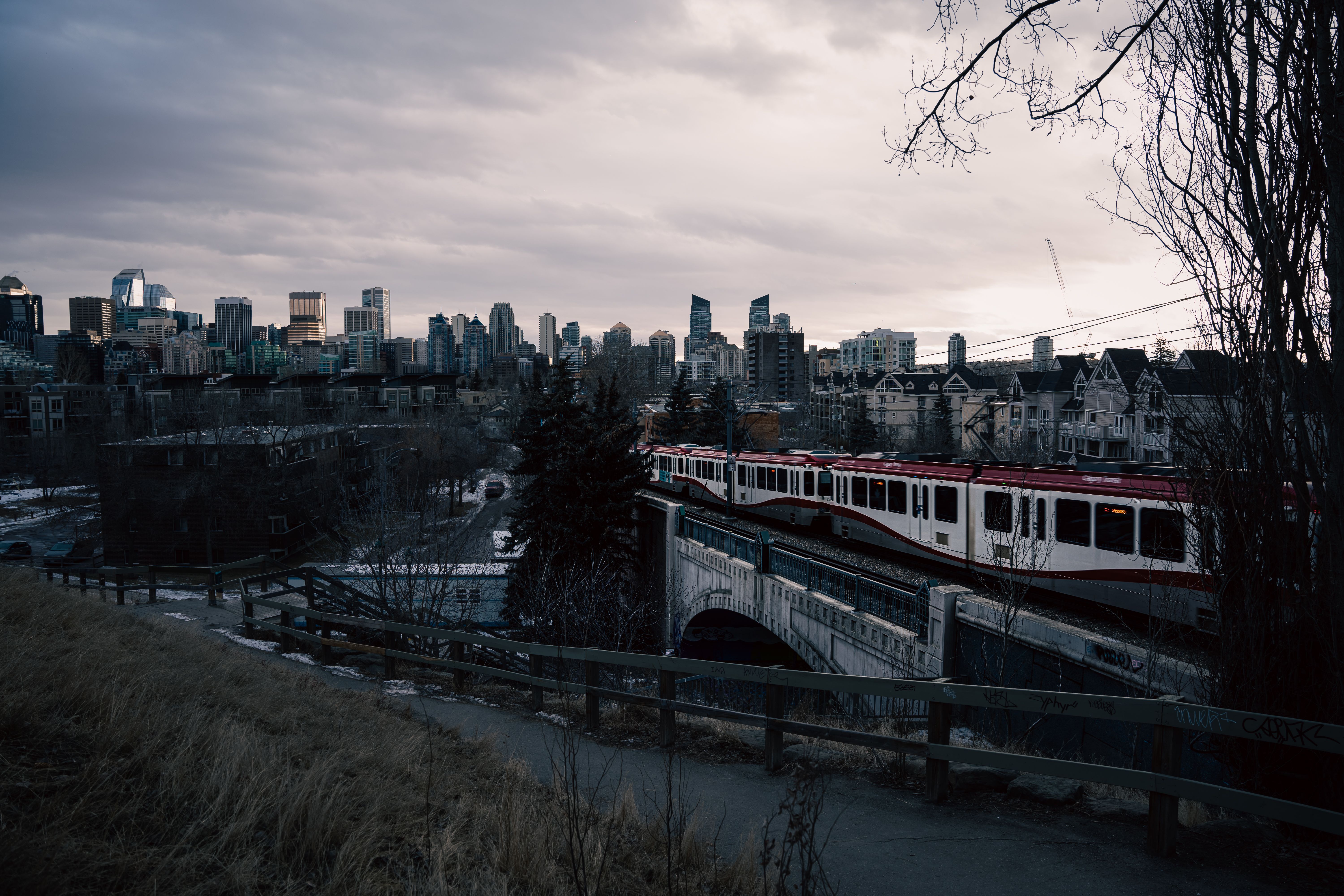 Calgary Skyline with Train during Overcast Day · Free Stock Photo