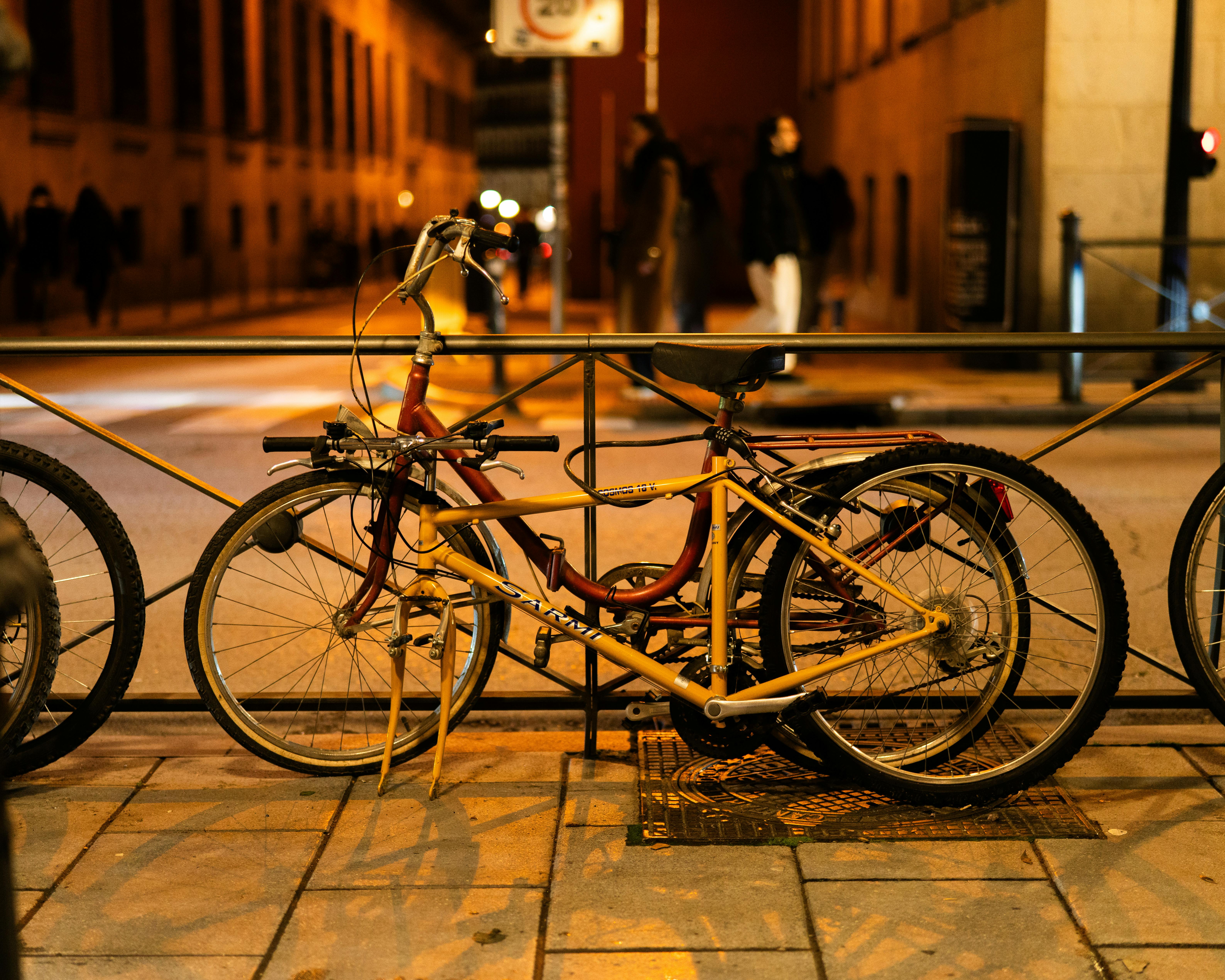 Street Scene with Bicycle at Night in City · Free Stock Photo