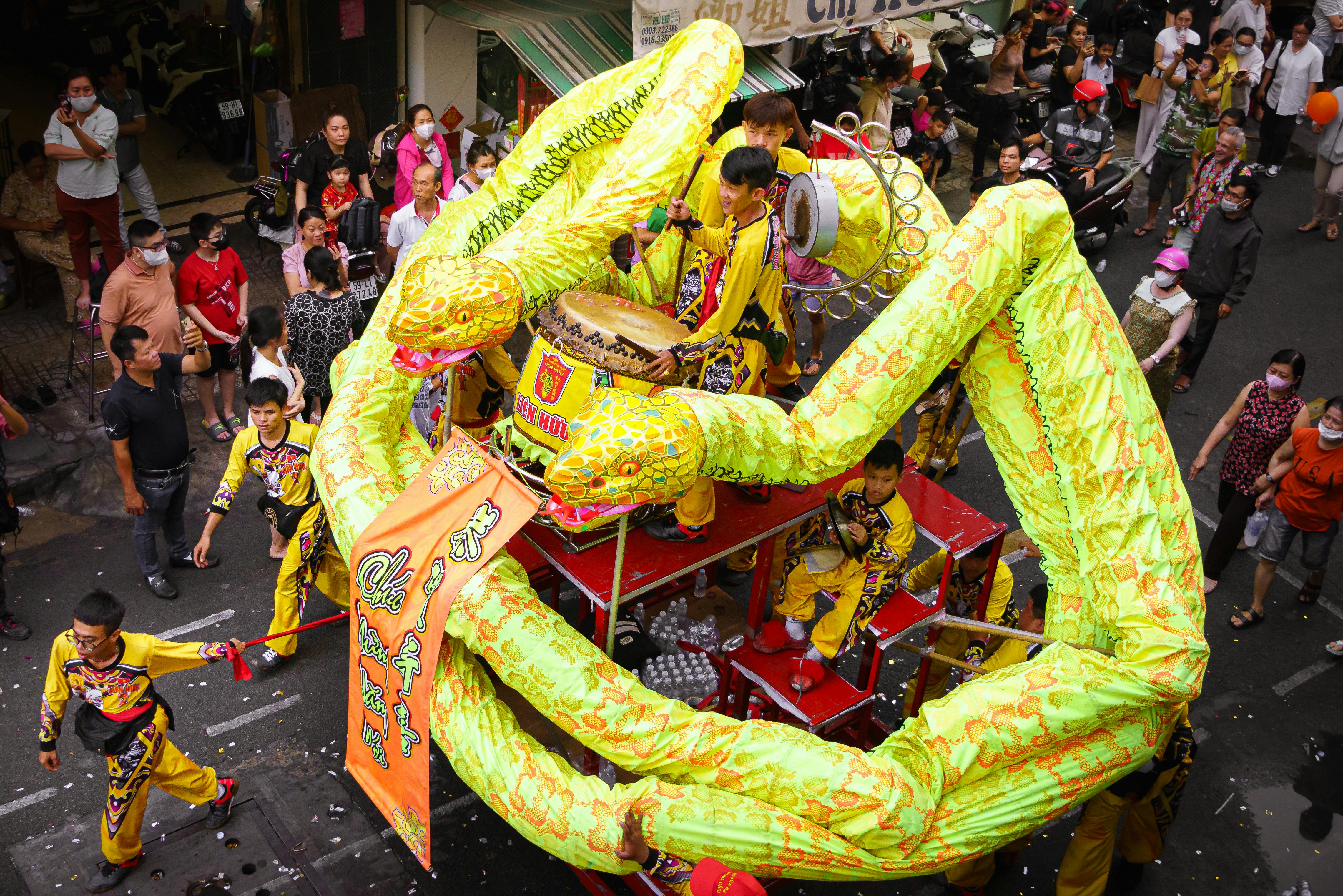 Vibrant Vietnamese Parade for Year of the Snake 2025 · Free Stock Photo