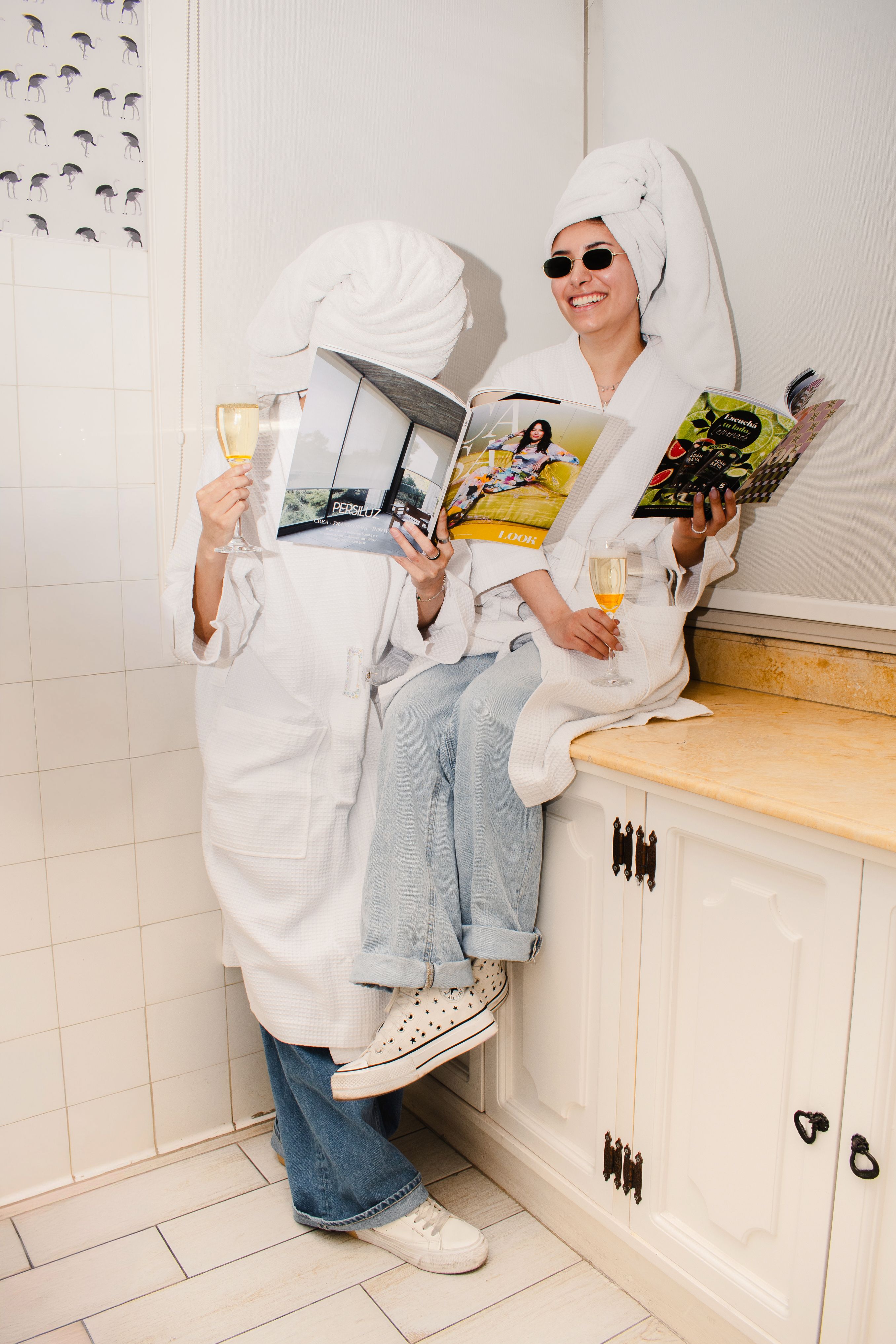 Women Relaxing with Magazines in Bathroom · Free Stock Photo