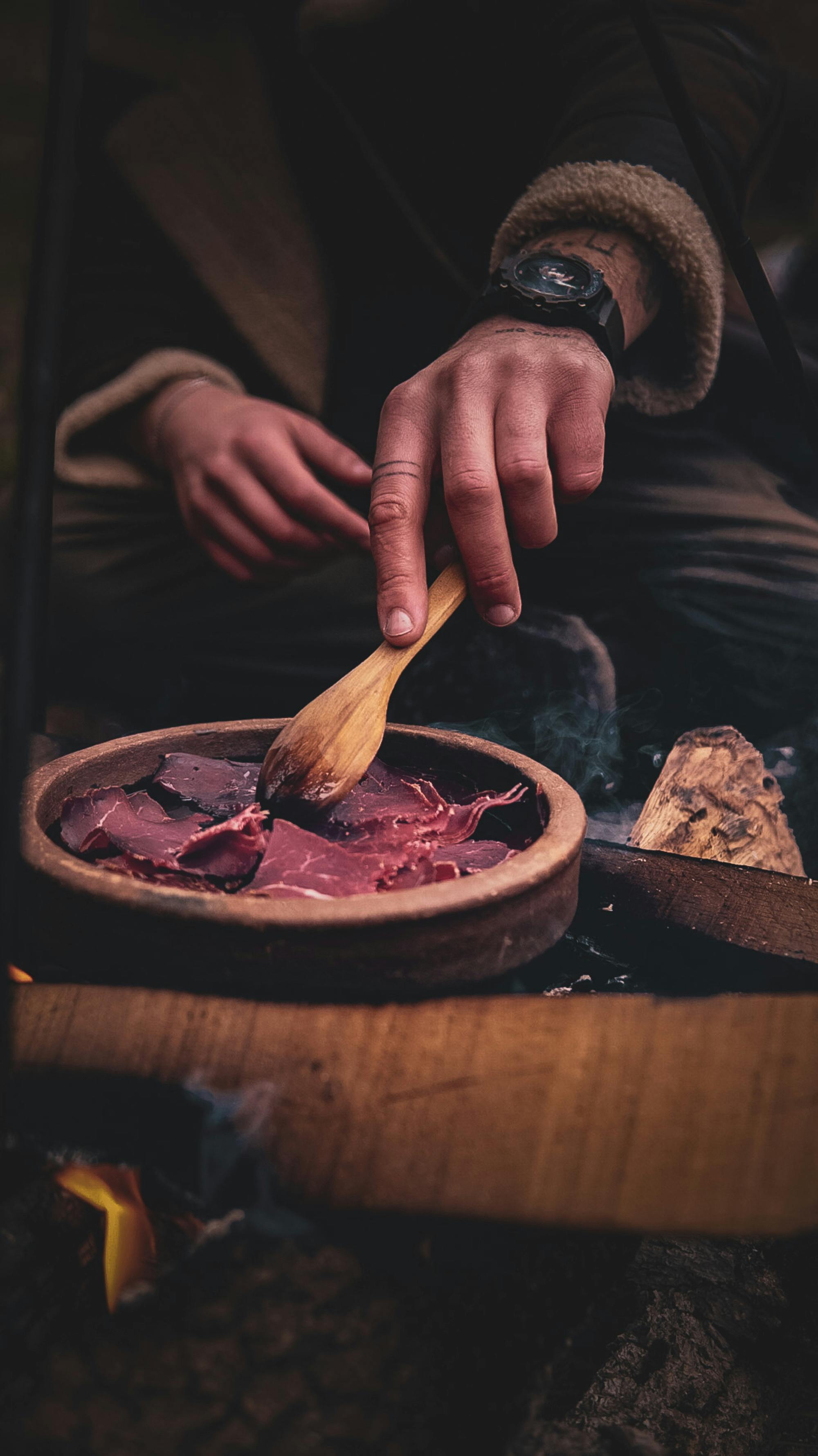 Rustic Outdoor Cooking Over Open Fire · Free Stock Photo