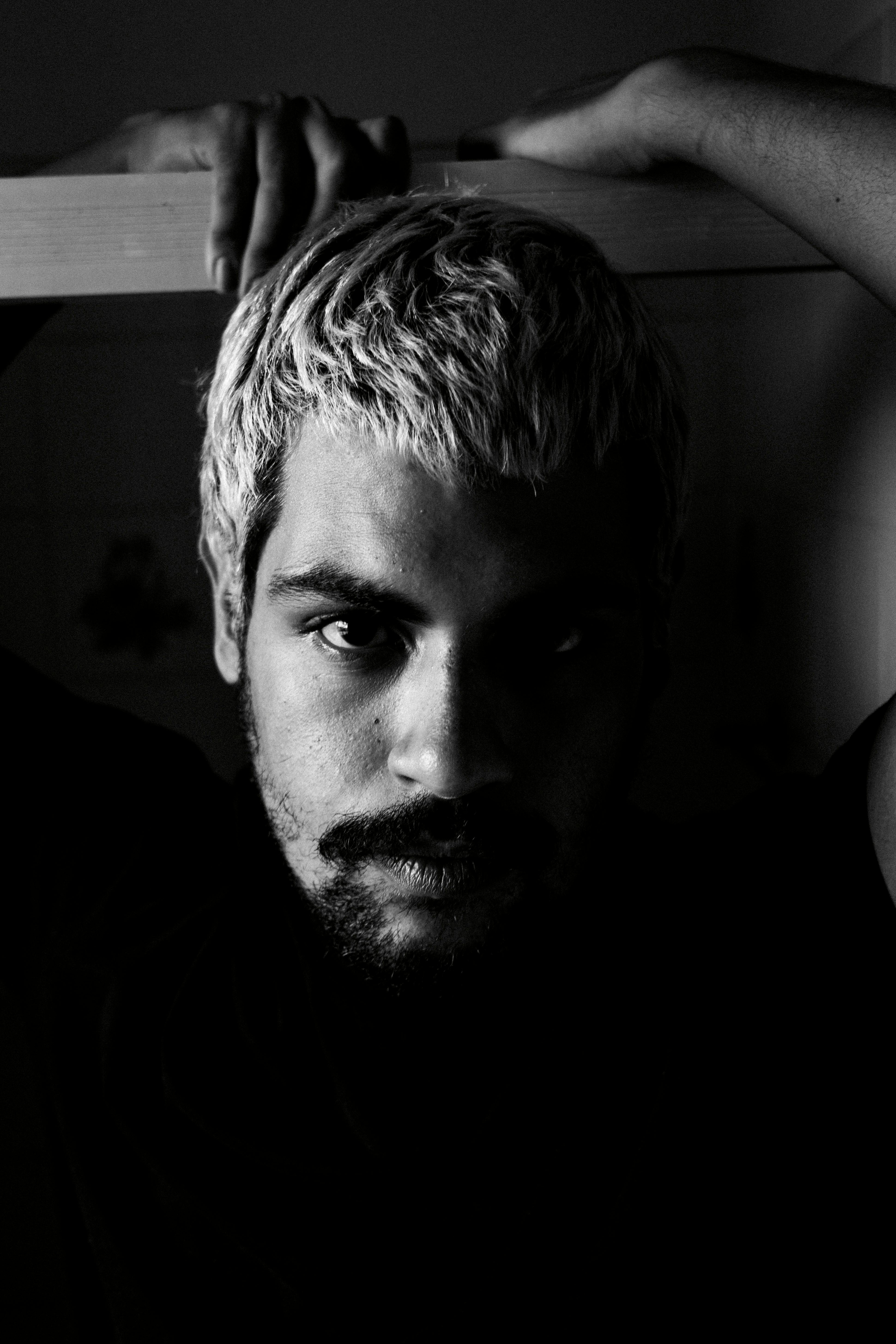 Grayscale Photography of a Man Looking at the Camera · Free Stock Photo