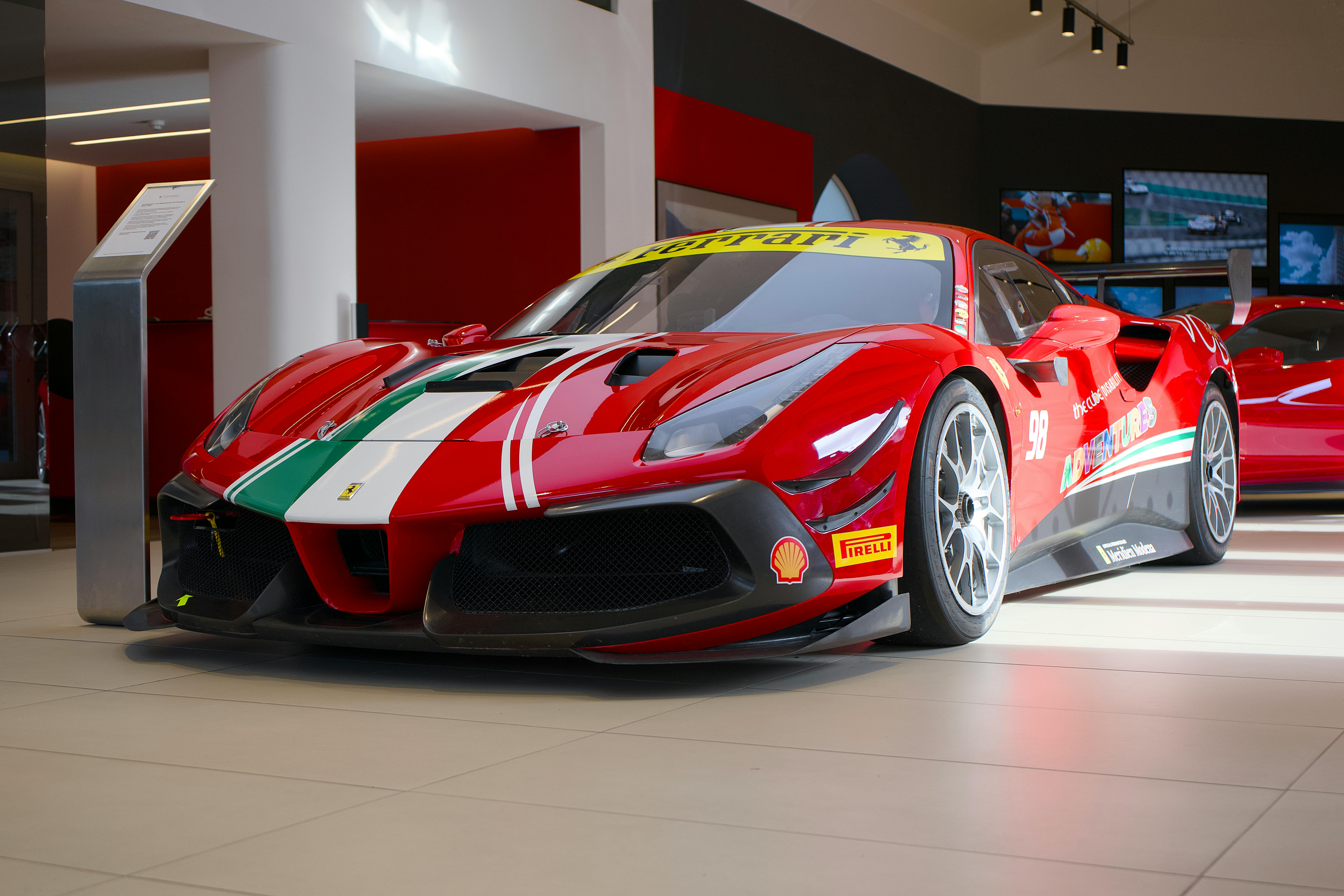 Red Ferrari Testarossa and White Lamborghini Countach · Free Stock Photo
