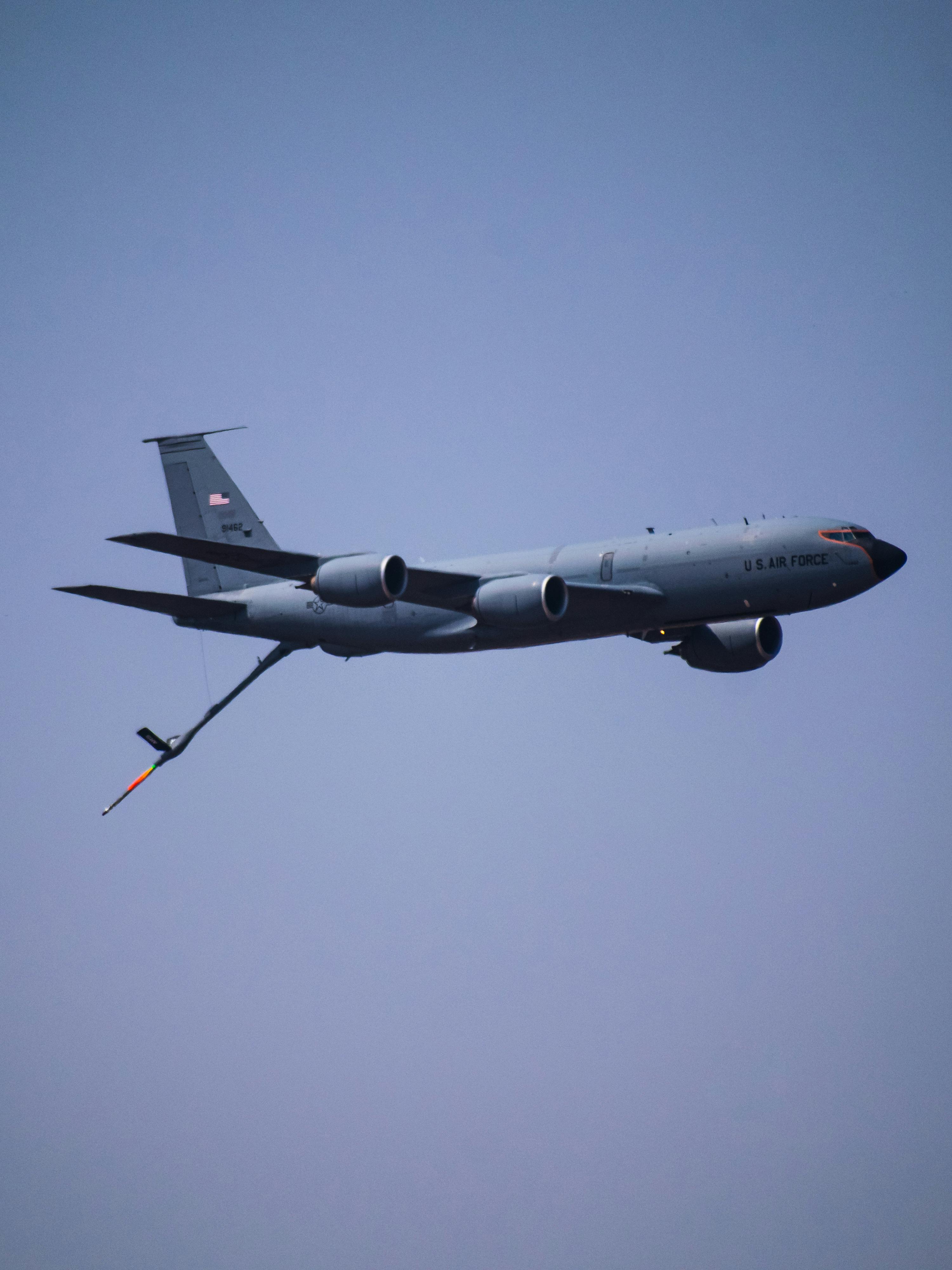 Military Airplane Mid-Flight Refueling Operation · Free Stock Photo