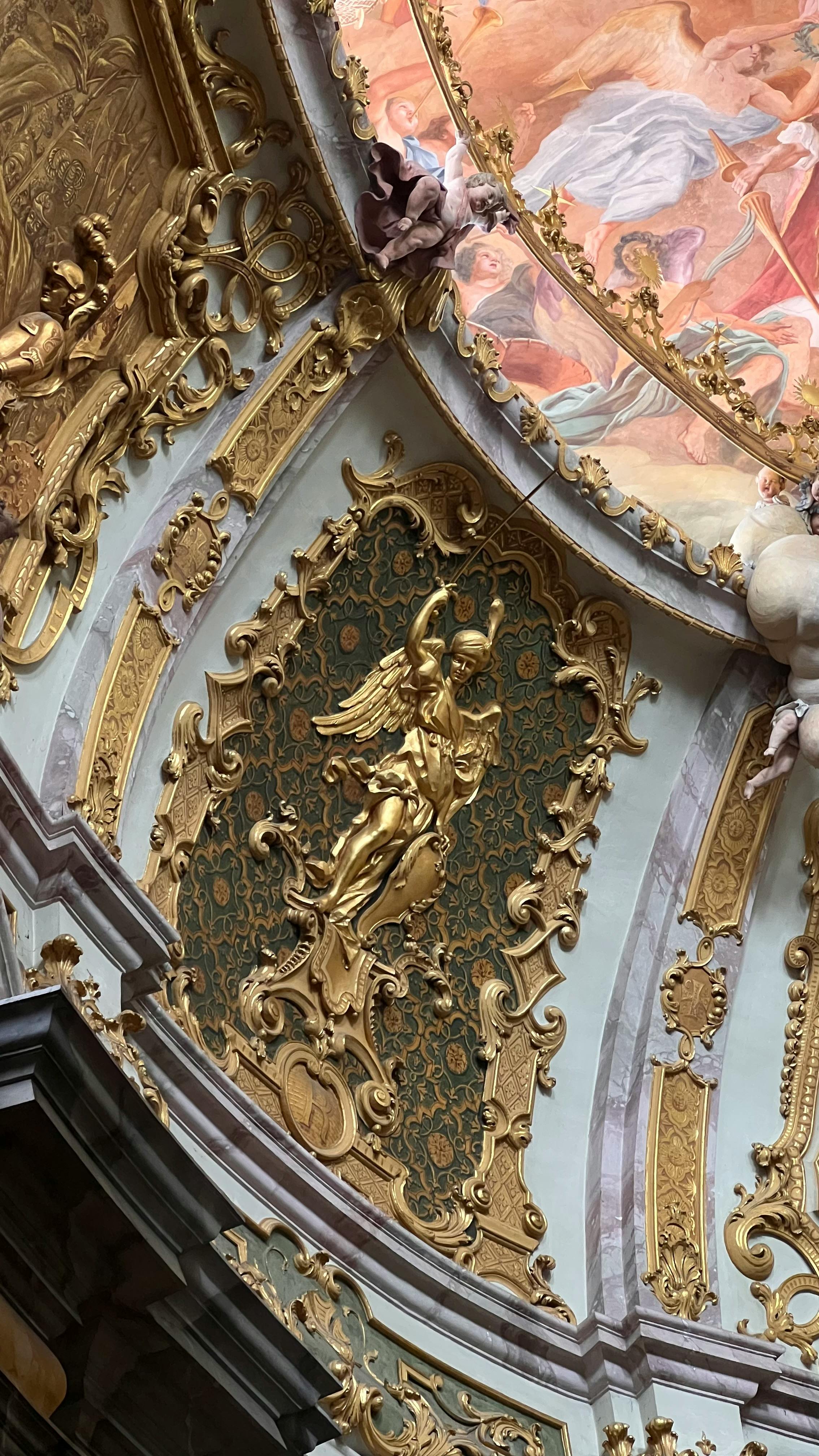 Ornate Baroque Ceiling Fresco and Gilded Angel Sculpture · Free Stock Photo