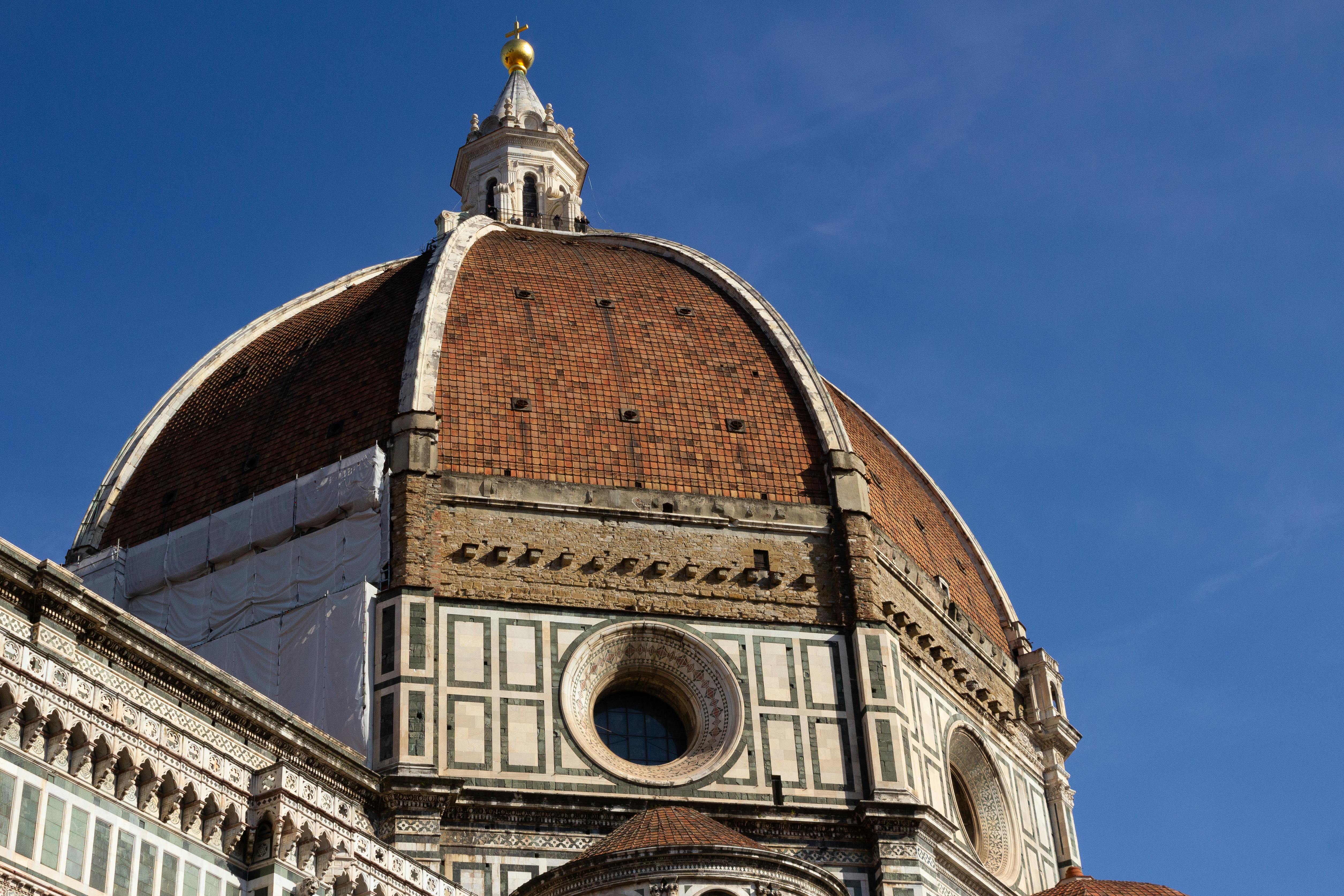 Iconic Florence Cathedral Dome Against Blue Sky · Free Stock Photo