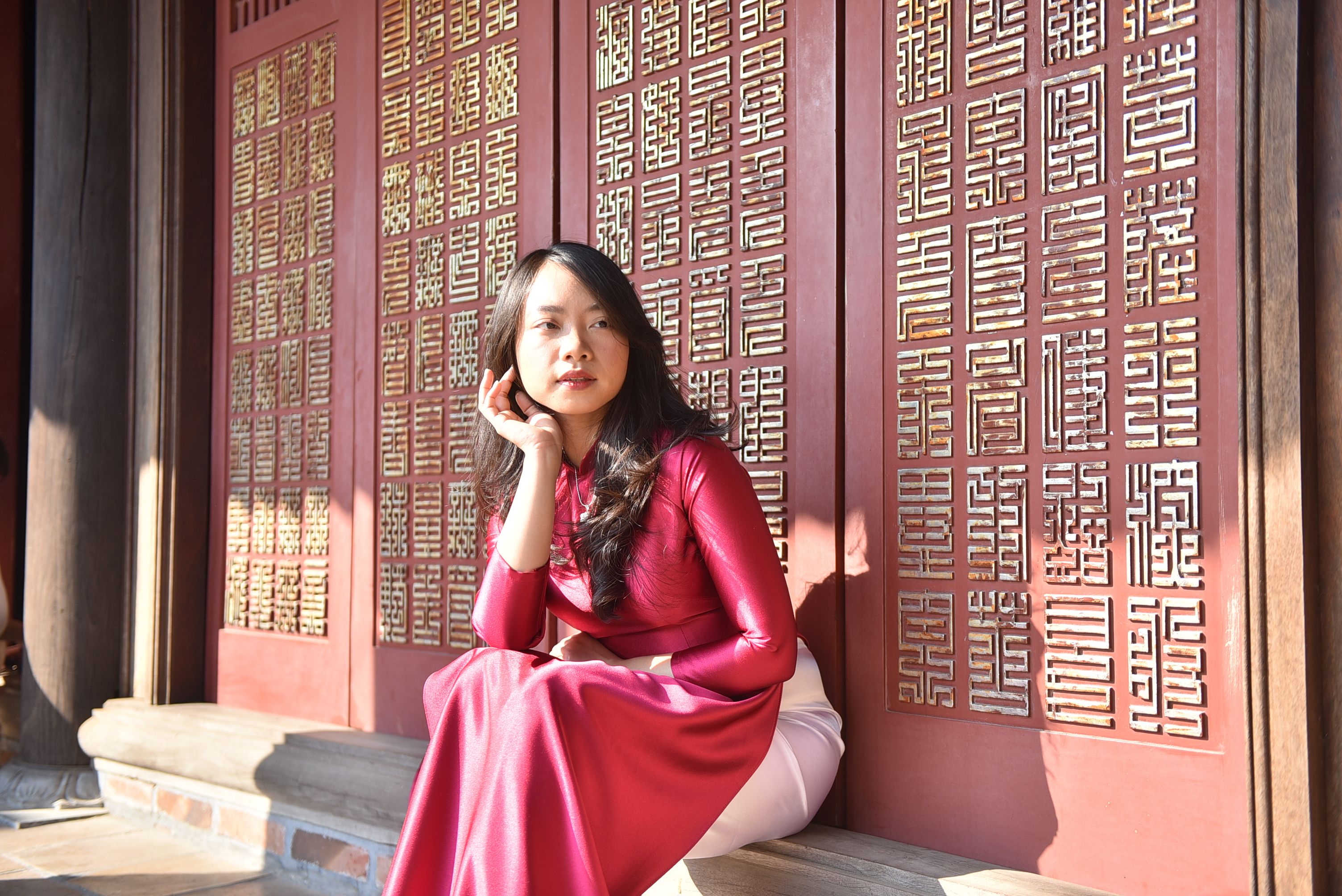 Woman in Traditional Dress at Asian Temple · Free Stock Photo