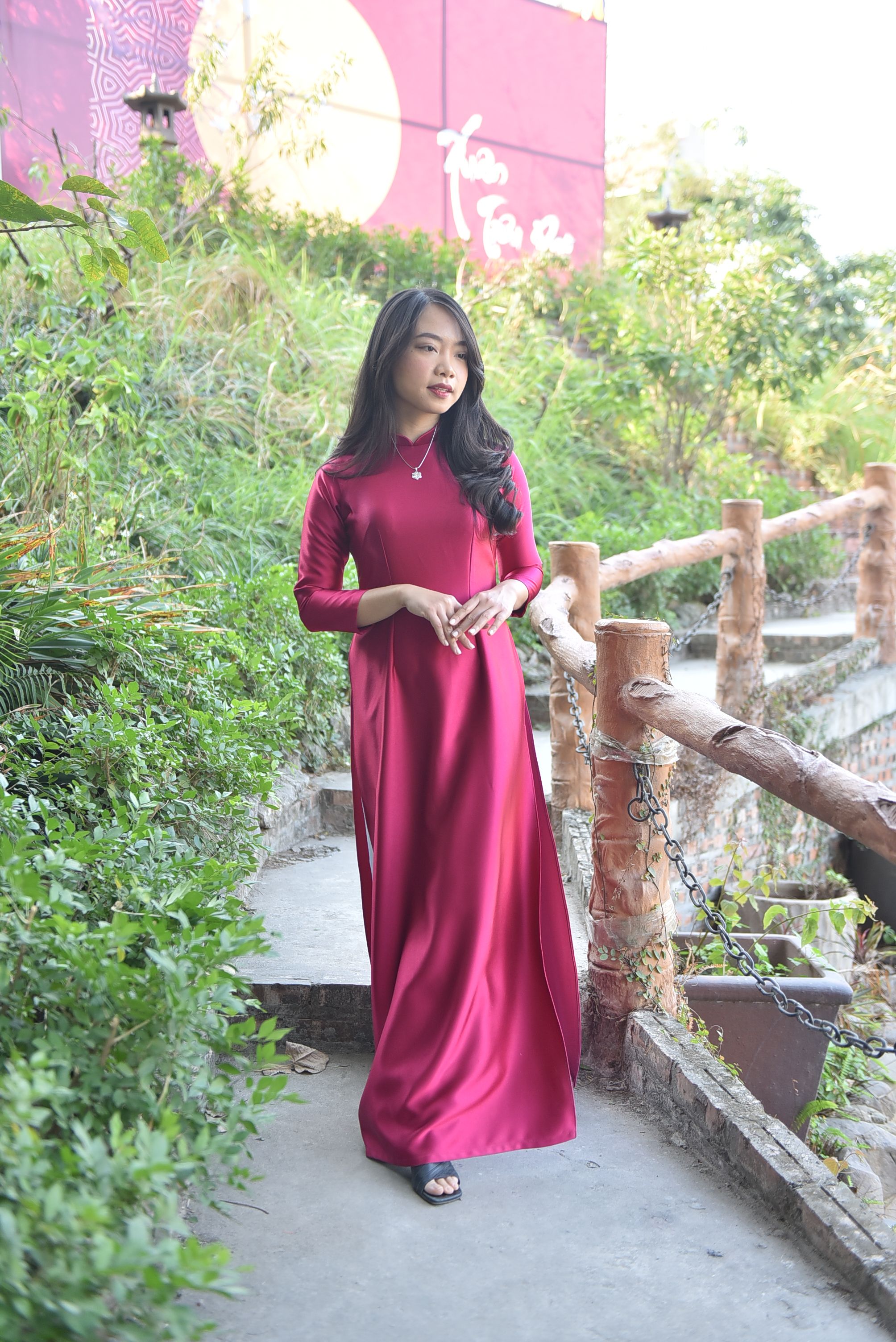 Elegant Woman in Traditional Red Vietnamese Outfit · Free Stock Photo