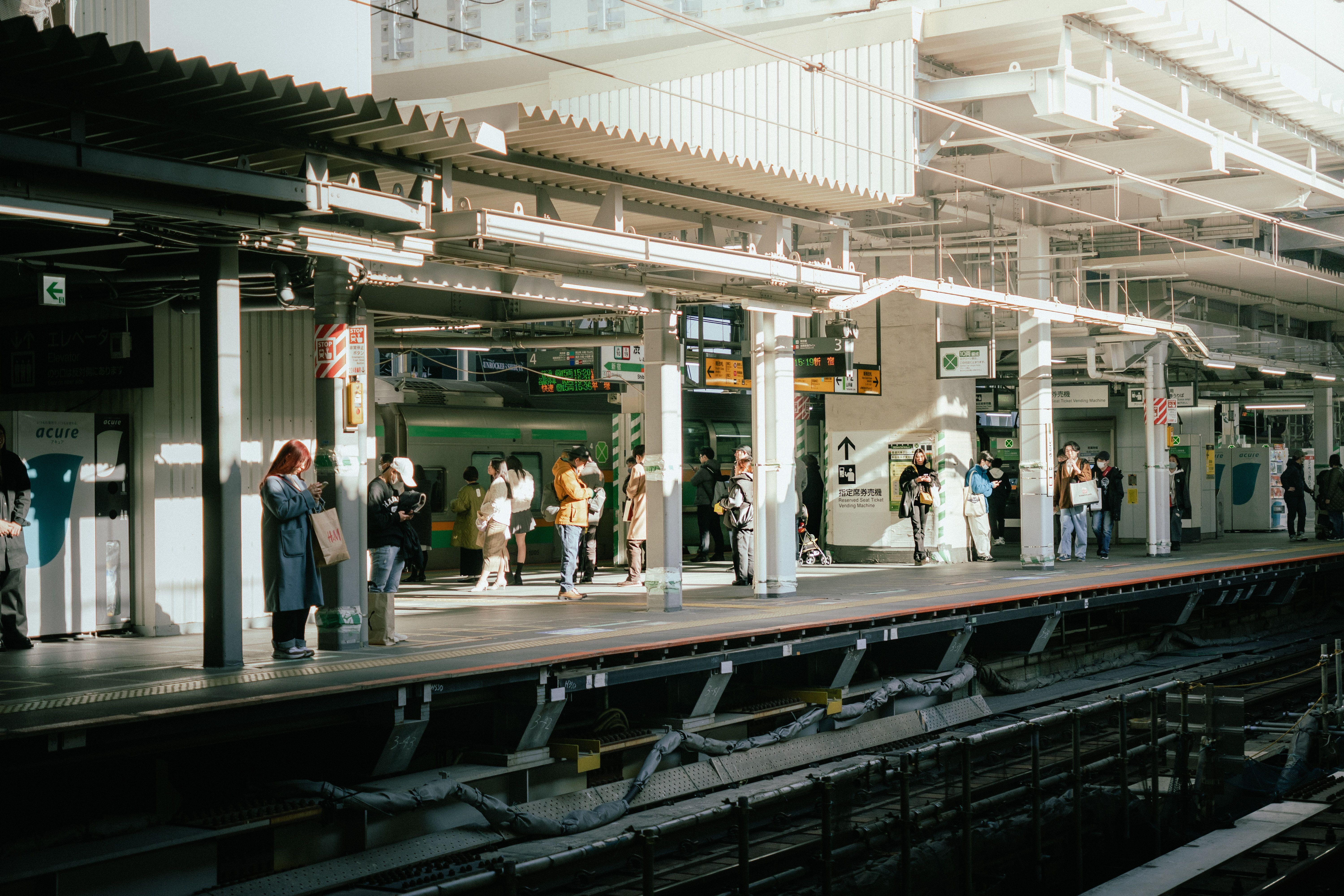 Busy Urban Train Station Platform in Daylight · Free Stock Photo