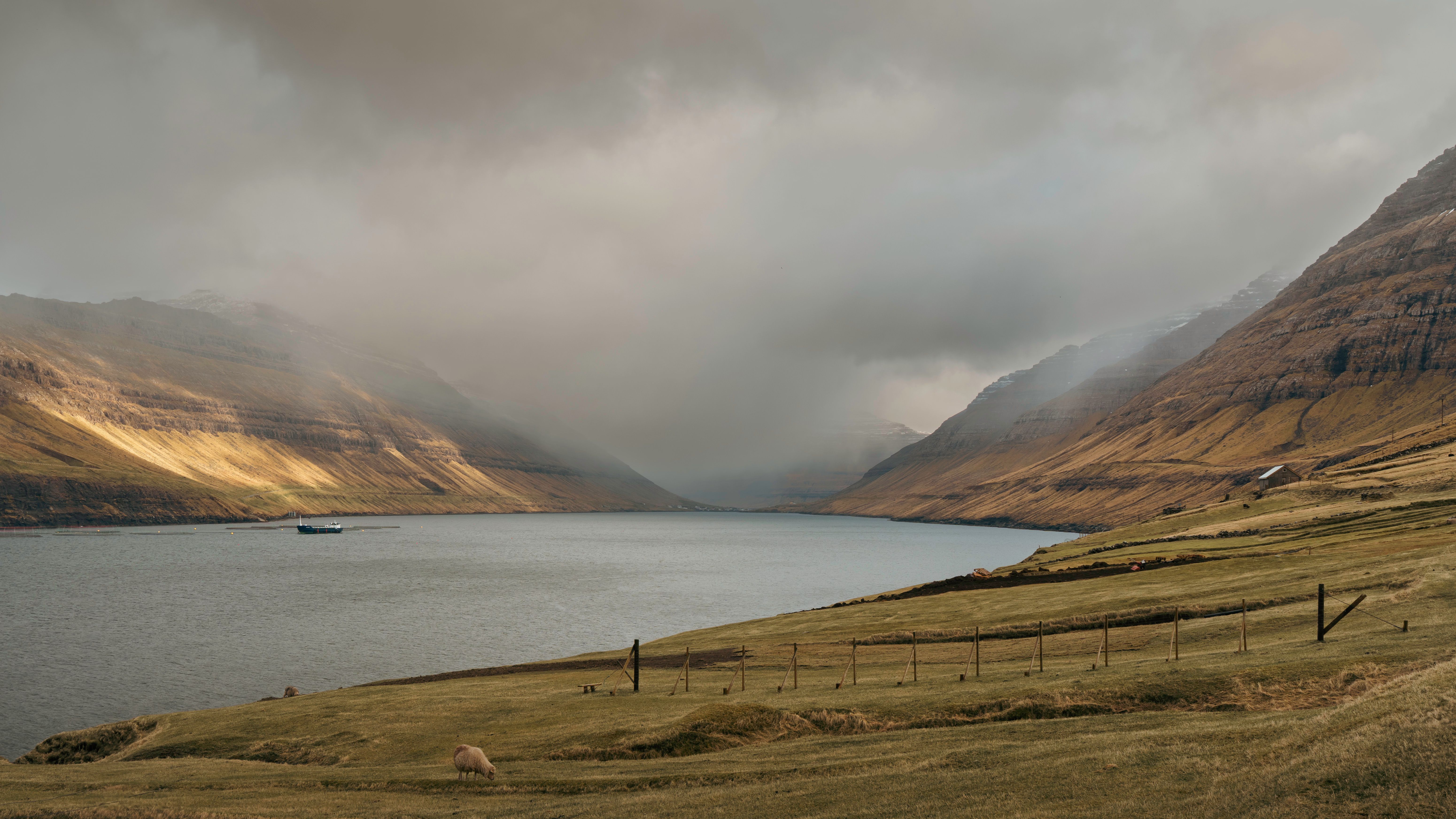 Scenic Faroe Islands Landscape with Fjord and Hills · Free Stock Photo
