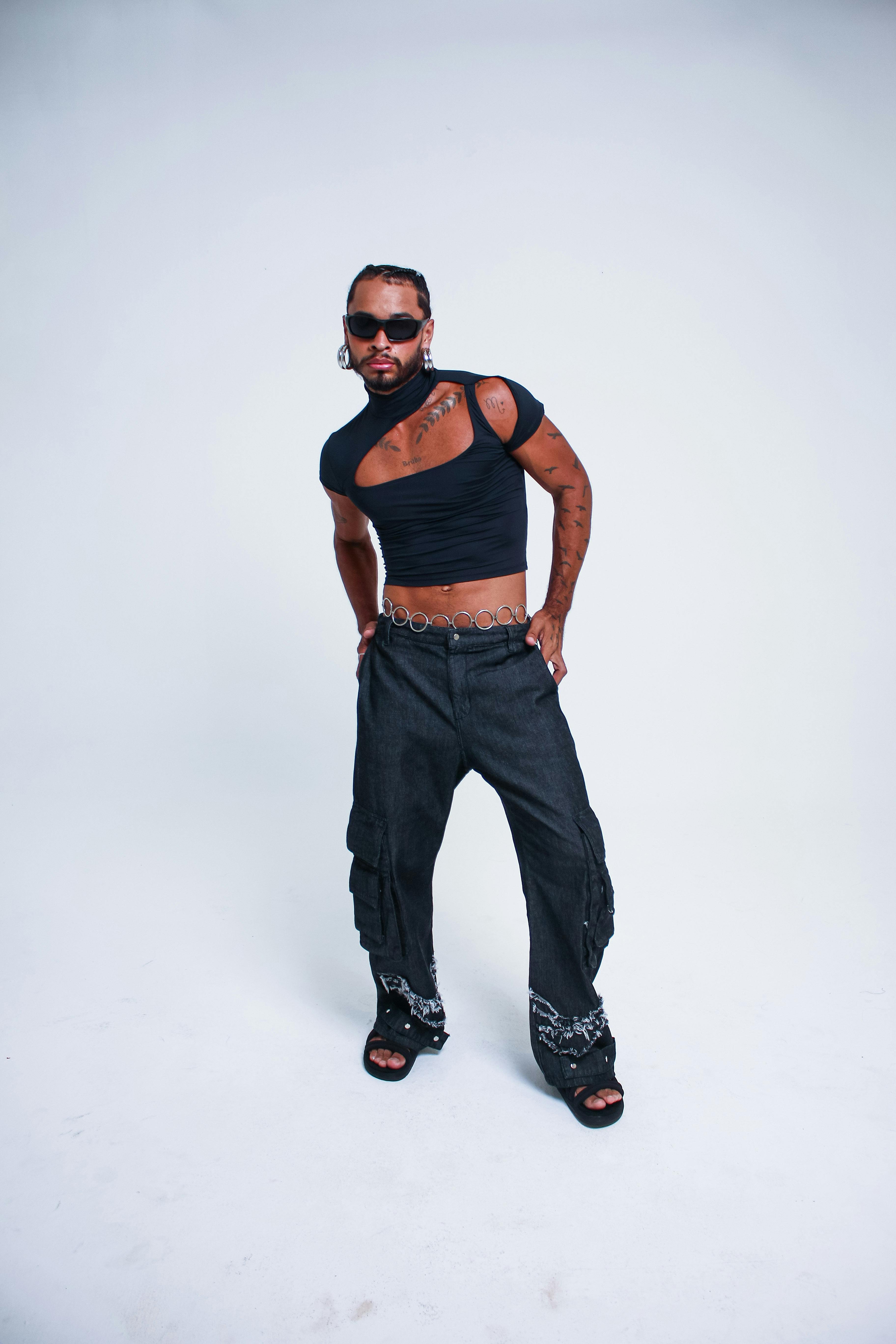 Fashionable Individual Posing in Modern Attire · Free Stock Photo