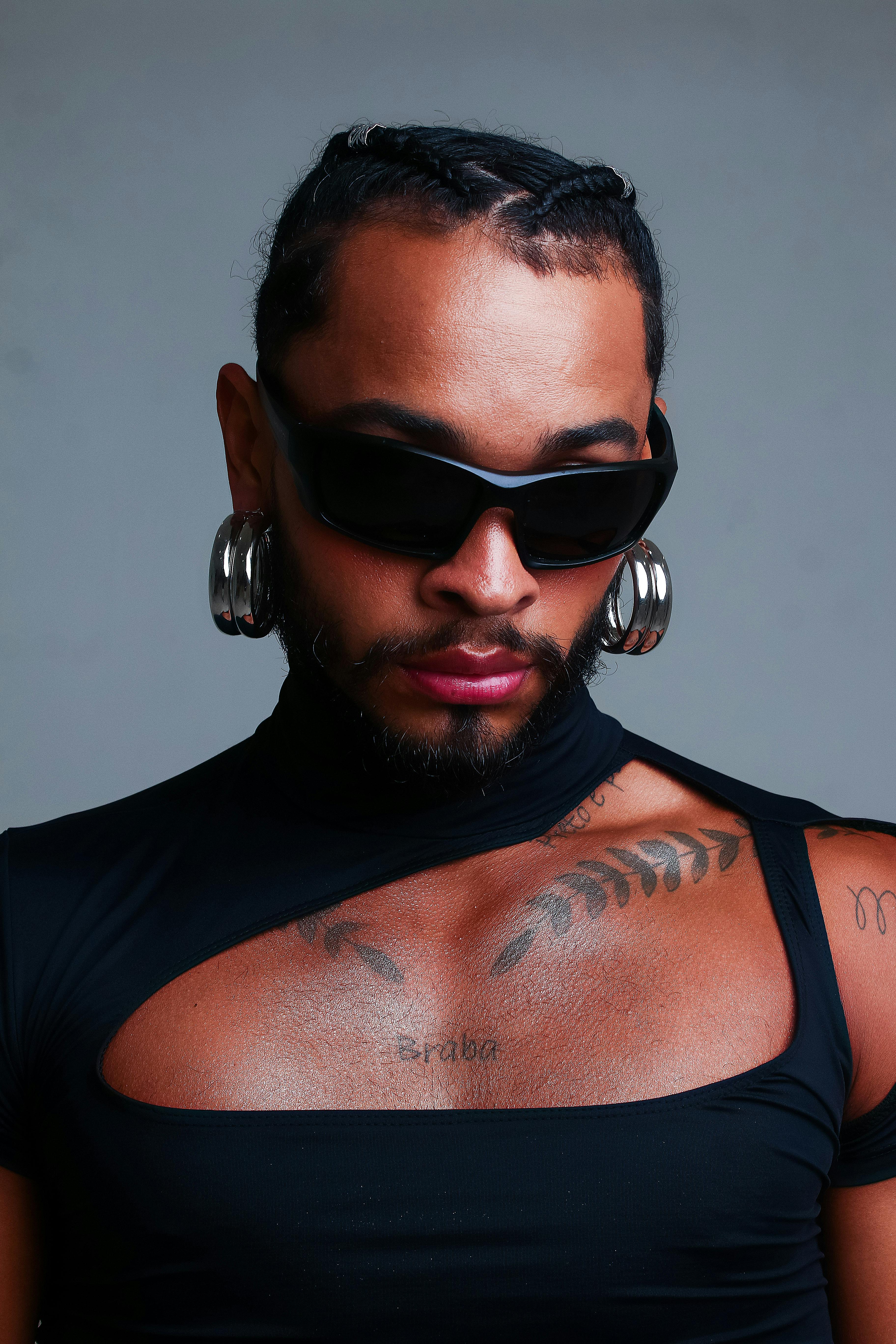 Fashionable Individual in Sunglasses and Black Outfit · Free Stock Photo