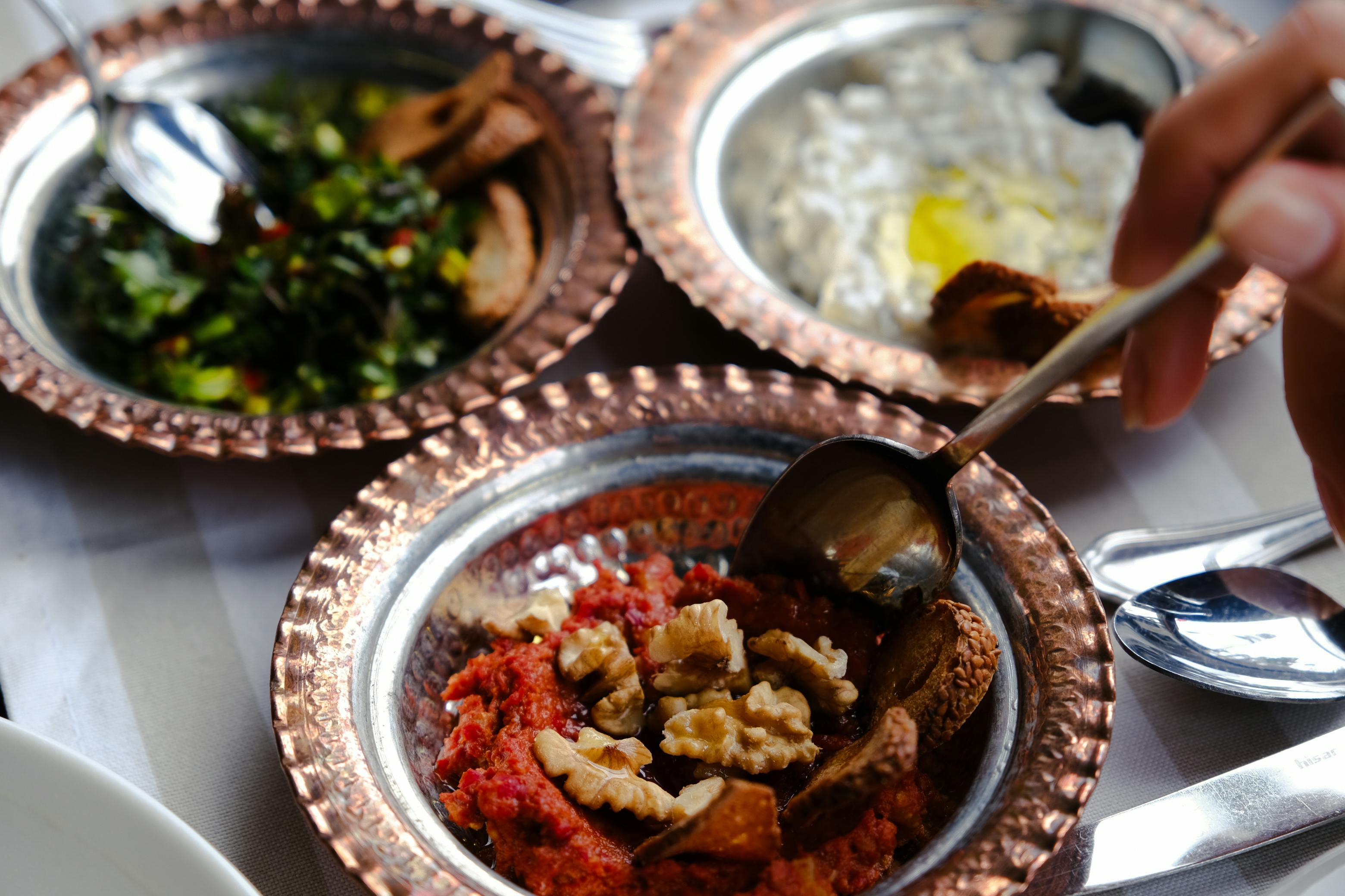Authentic Turkish Mezze Served in Copper Dishes · Free Stock Photo