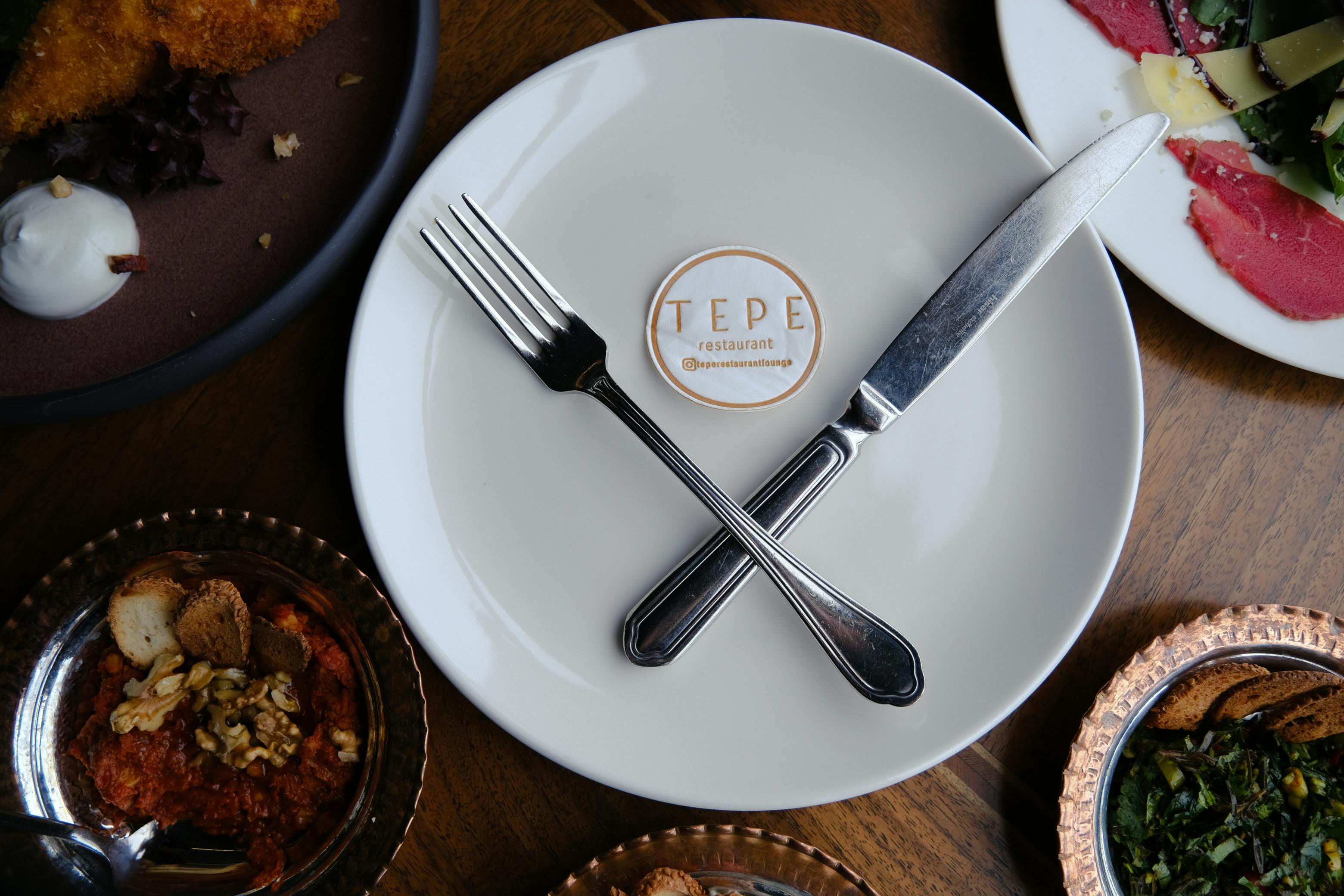 Gourmet Dish Presentation at Tepe Restaurant · Free Stock Photo