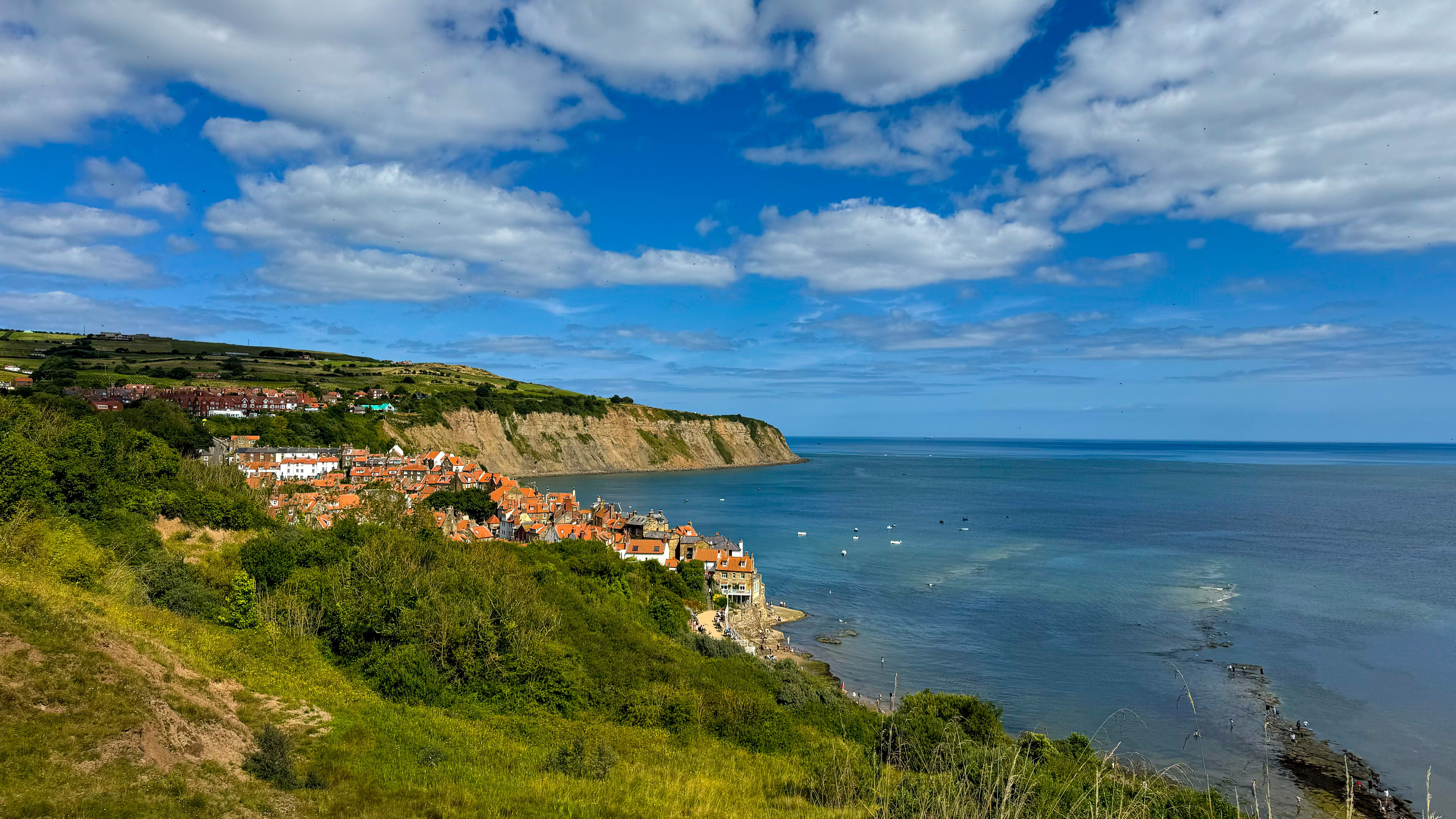 Scenic View of Whitby Coastline with Cliffs and Sea · Free Stock Photo