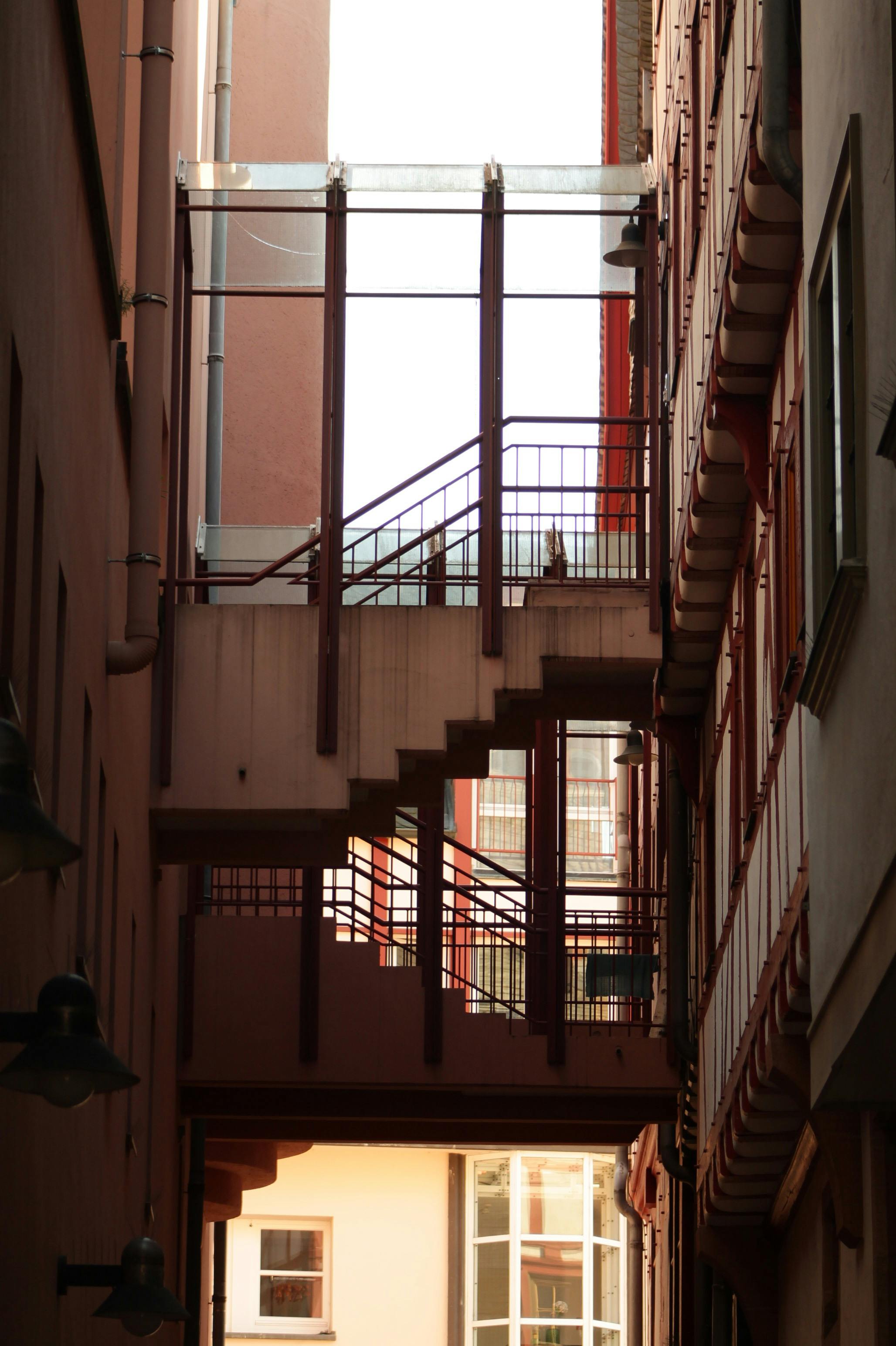 Modern Architectural Passageway with Shadow Play · Free Stock Photo