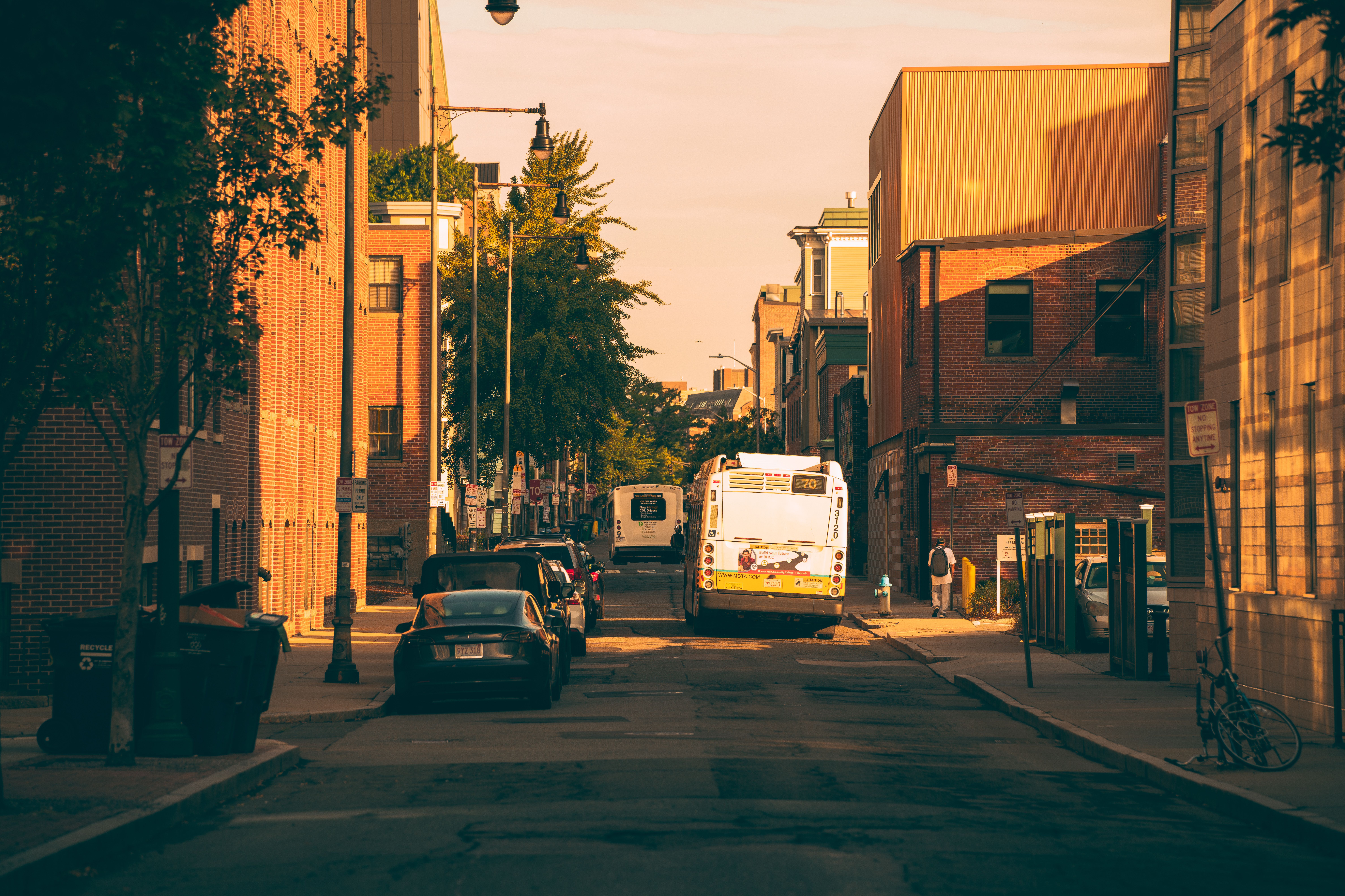 Urban Street Scene with Bus and Cars at Sunset · Free Stock Photo