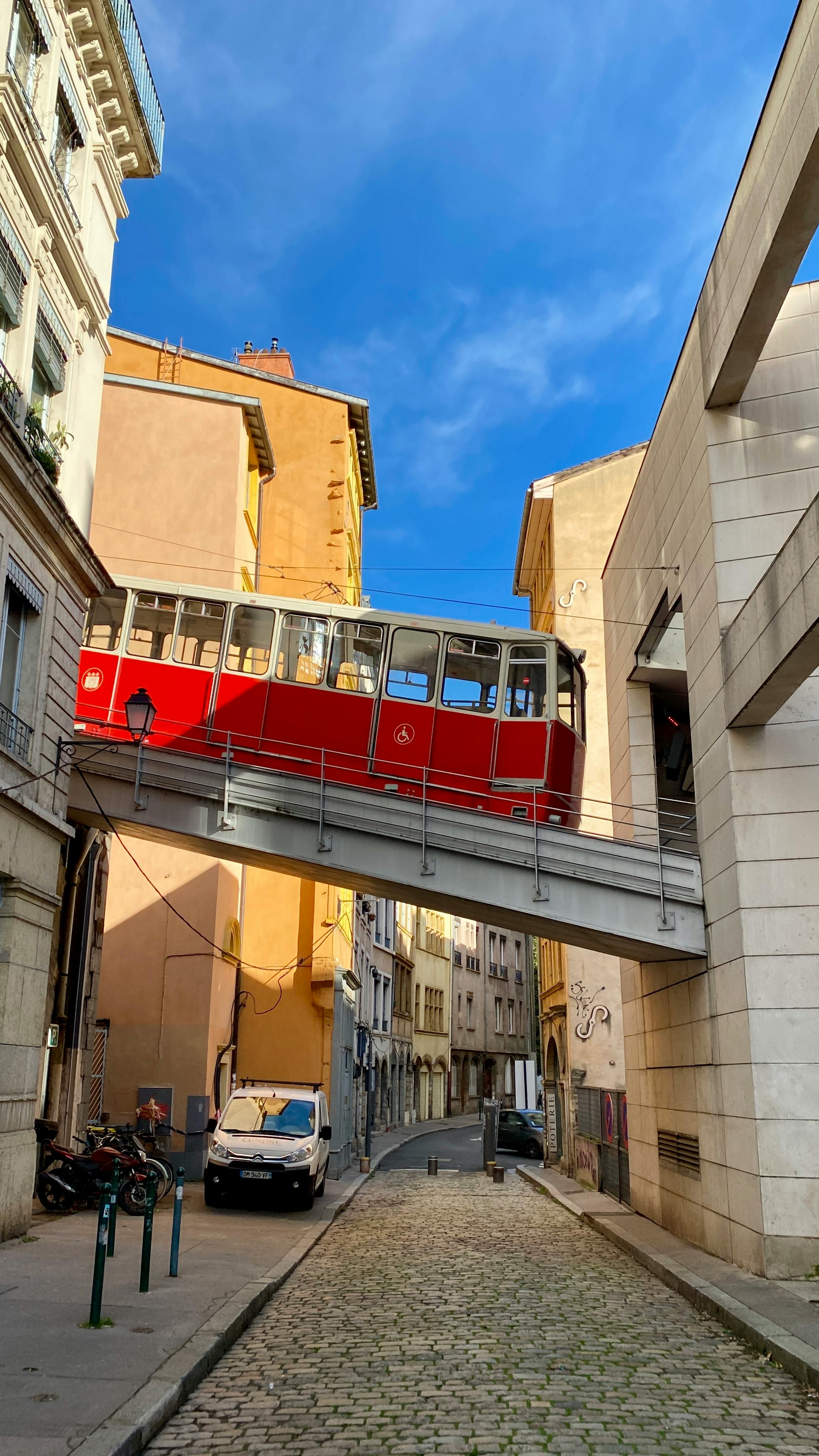 Red Funicular Street Scene in Lyon, France · Free Stock Photo