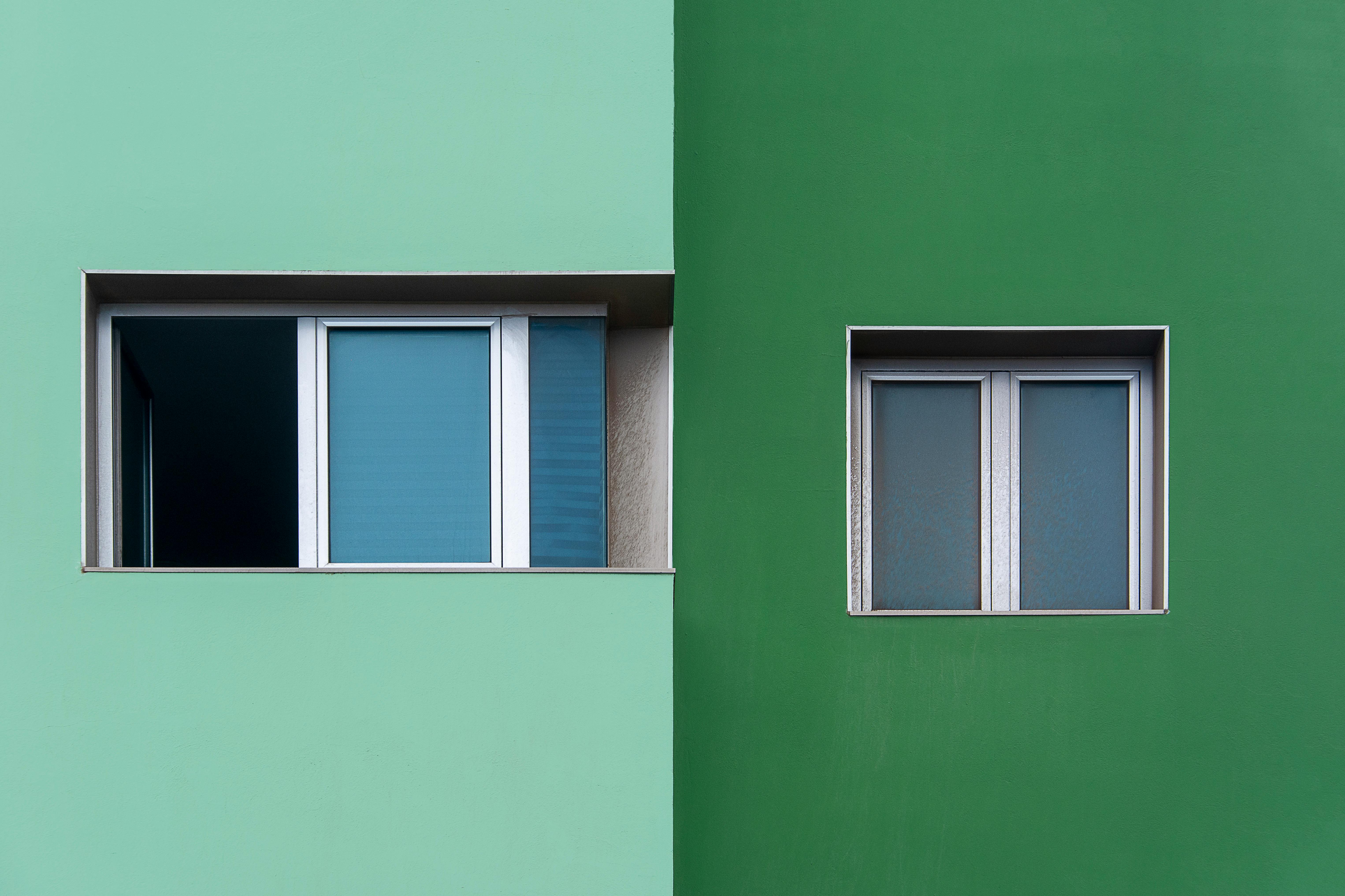 Modern Architectural Facade with Dual Windows · Free Stock Photo