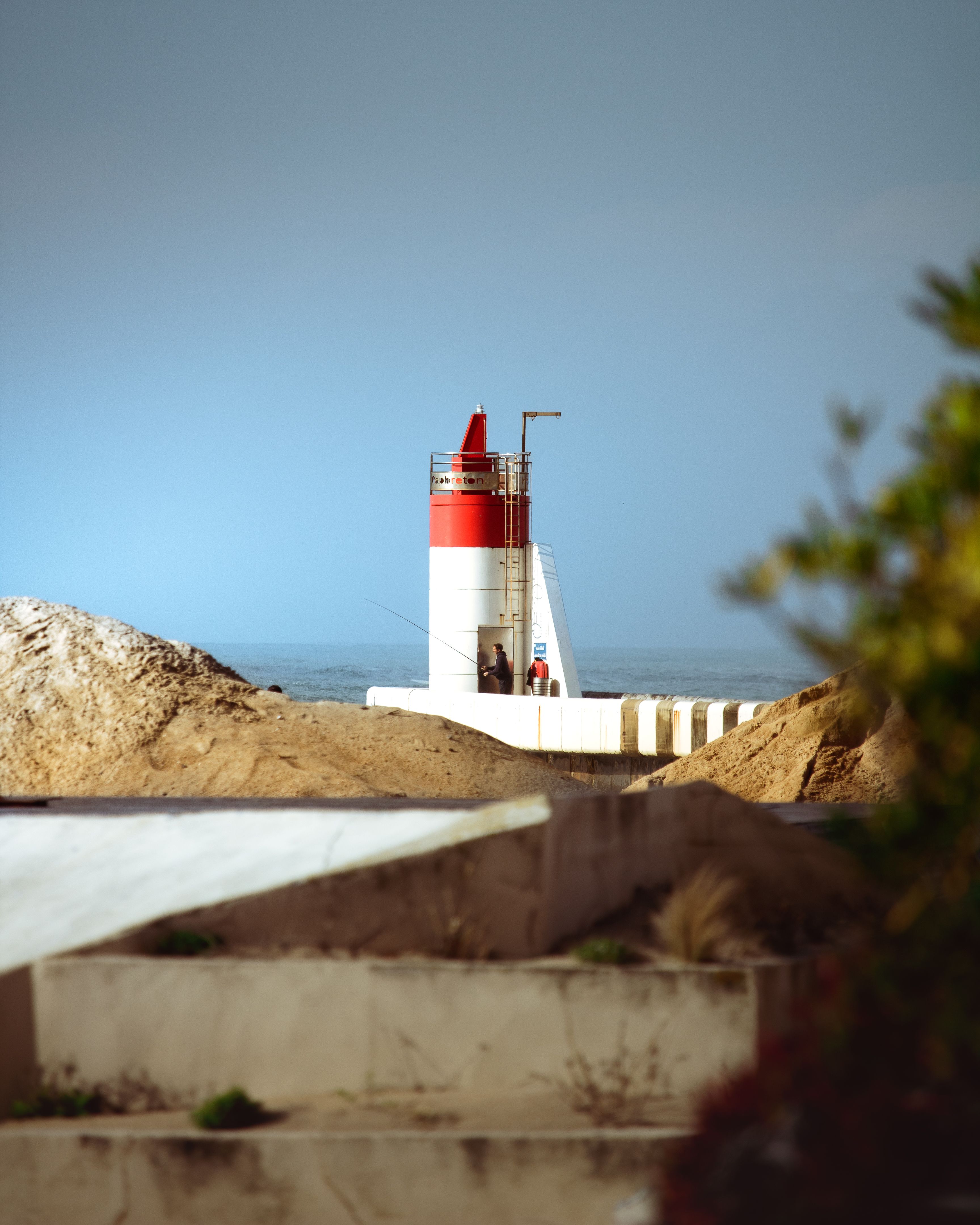 Scenic French Lighthouse at Seaside · Free Stock Photo