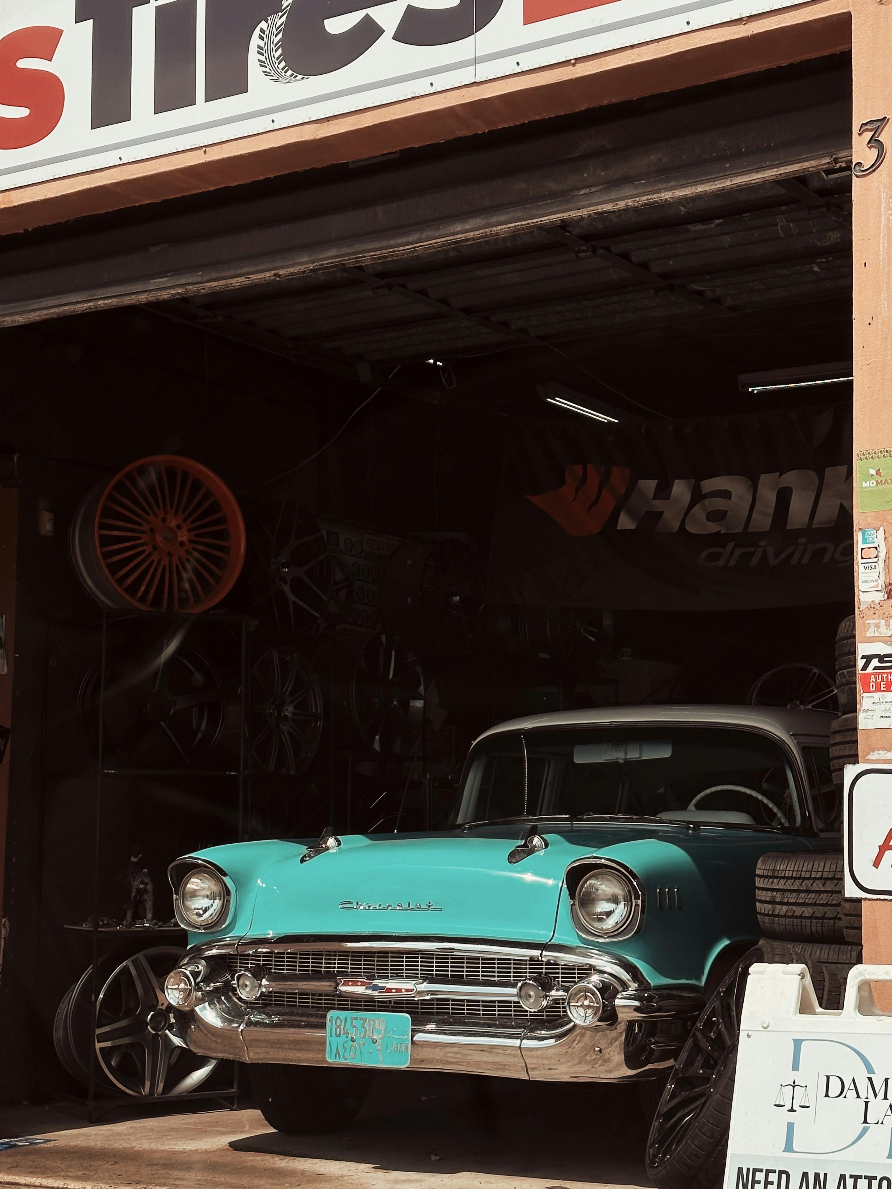Classic 1957 Chevrolet in Vintage Garage Setting · Free Stock Photo