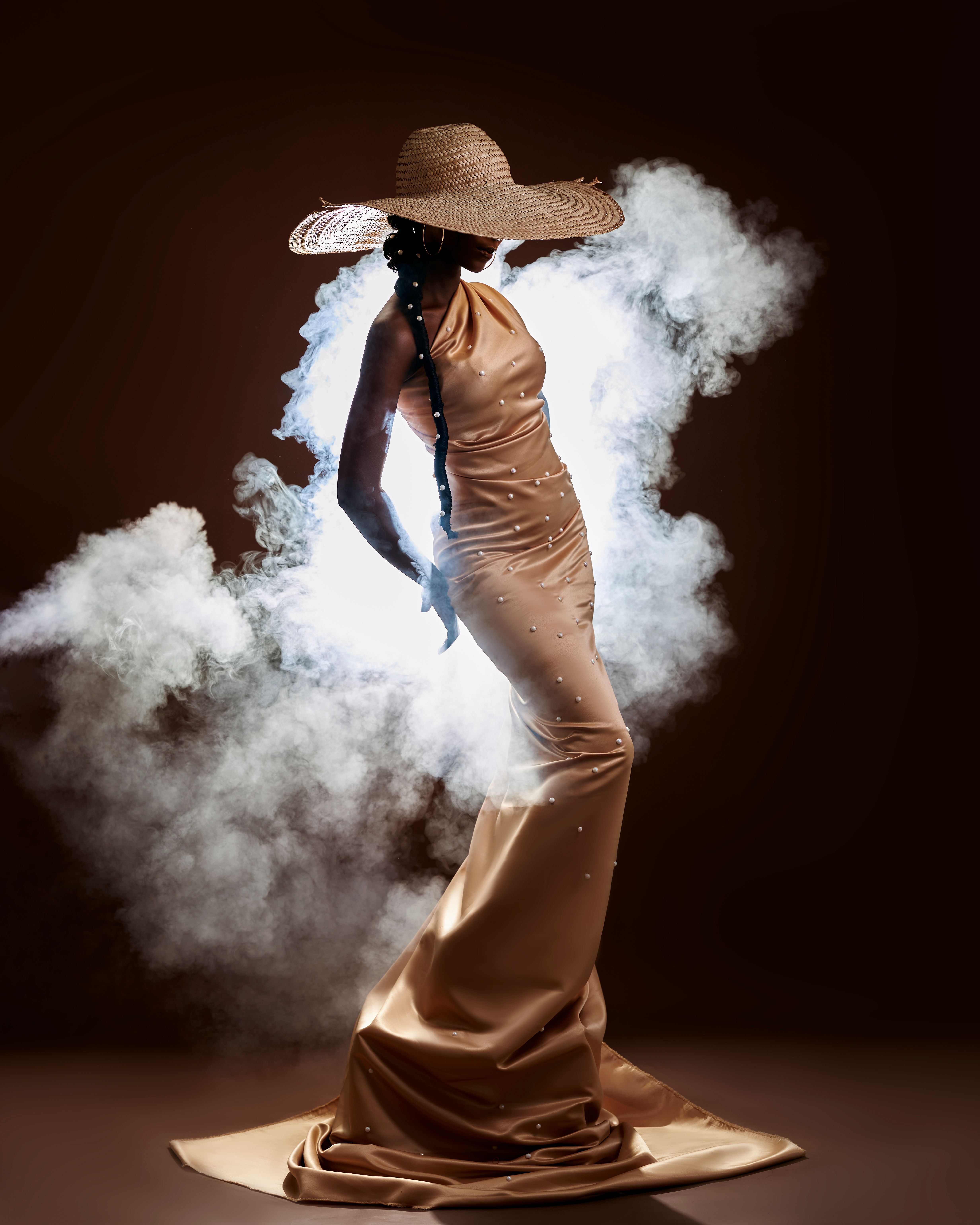 Elegant Woman in Dramatic Fashion Portrait · Free Stock Photo