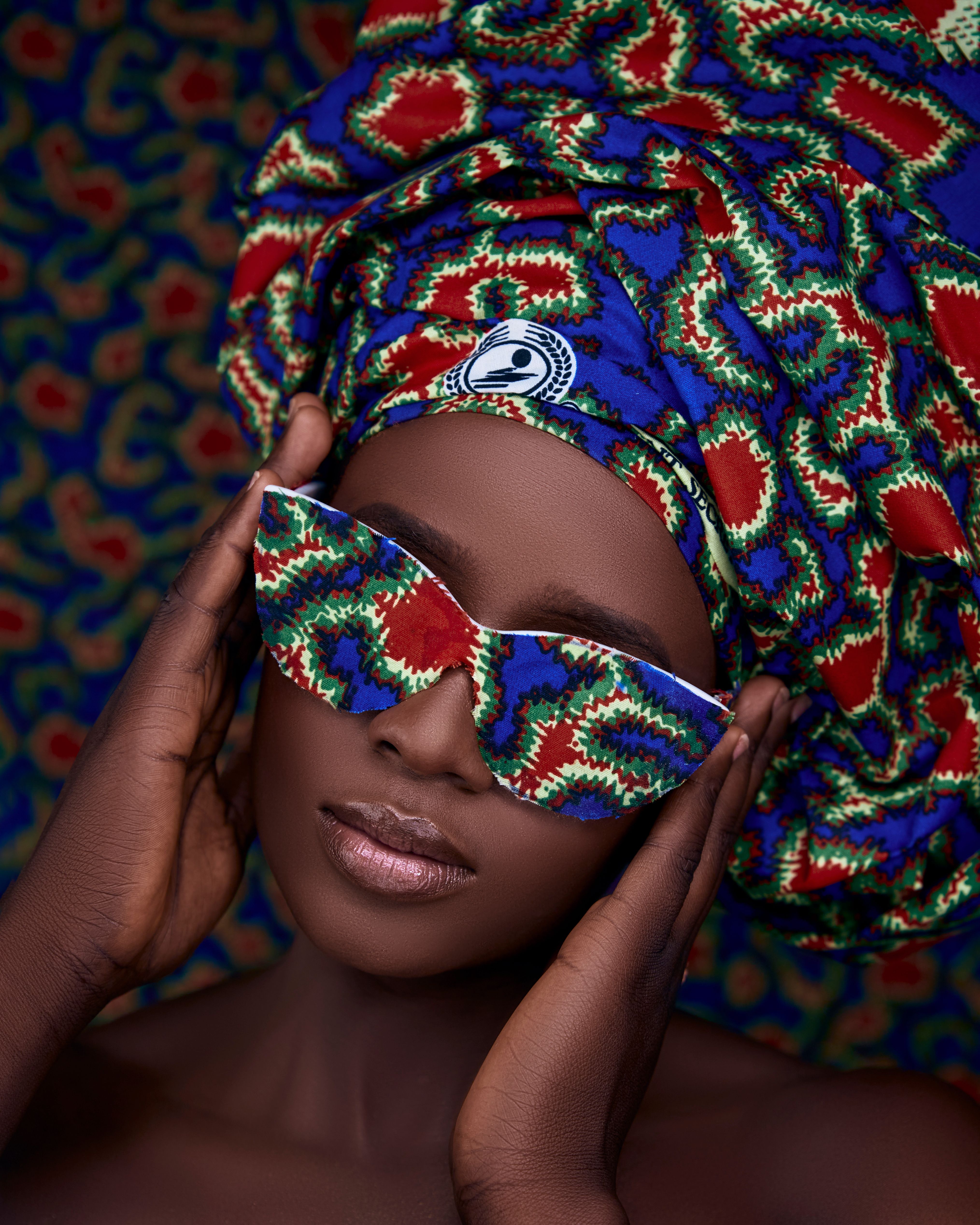 Vibrant African Fashion Portrait with Headwrap · Free Stock Photo