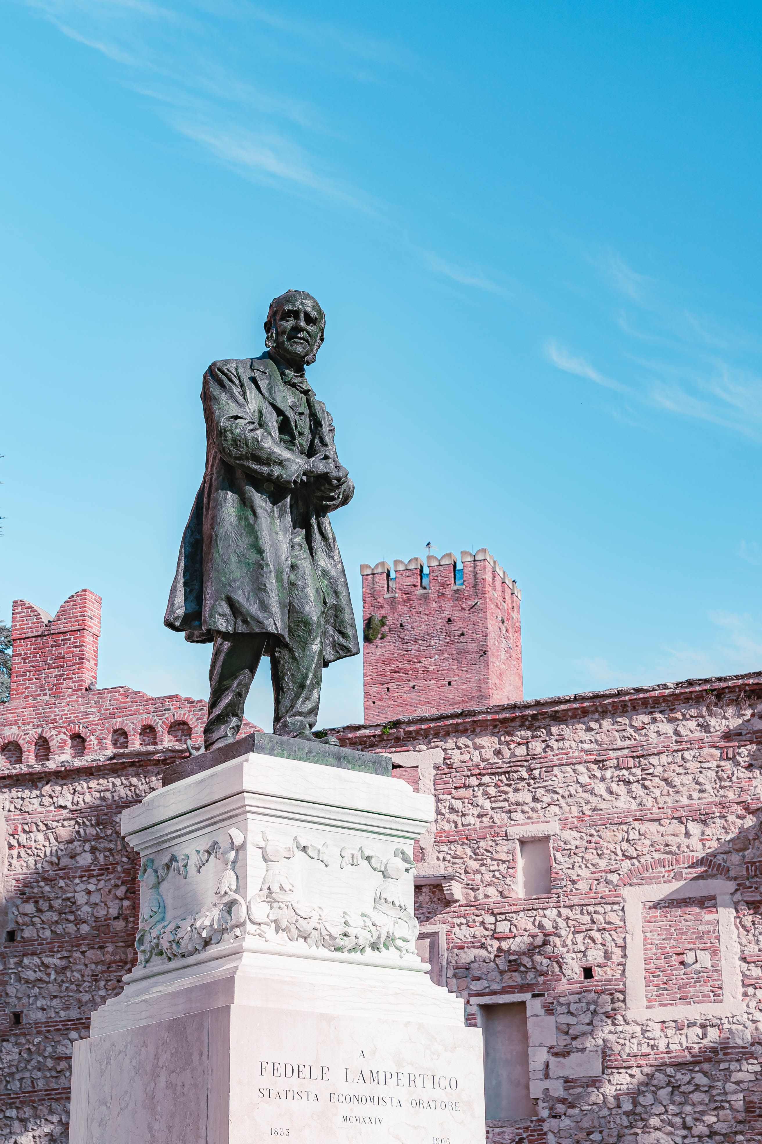 Historic Statue Against Blue Sky in Italian City · Free Stock Photo