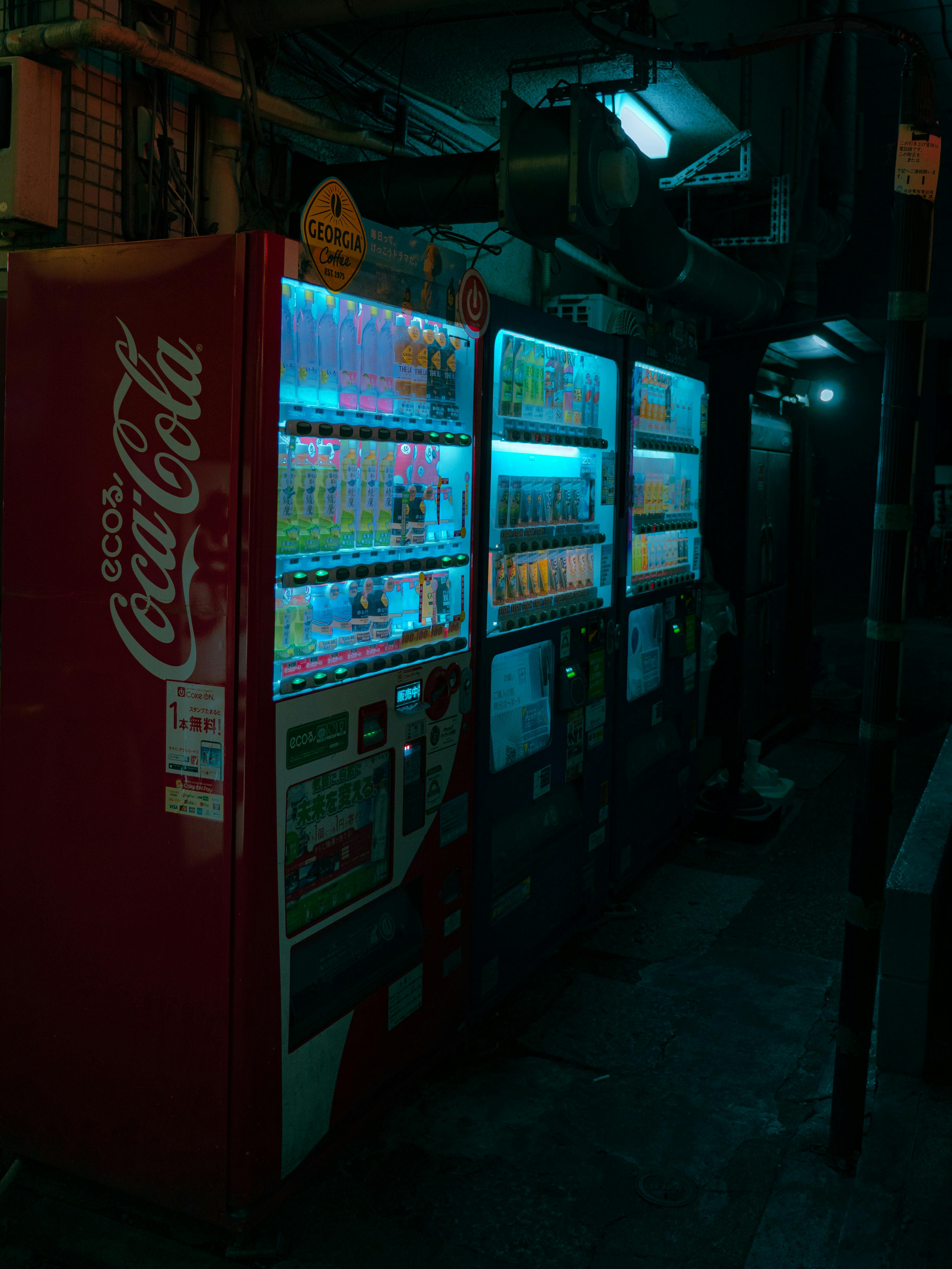Neon-lit Vending Machines in Night Alley · Free Stock Photo